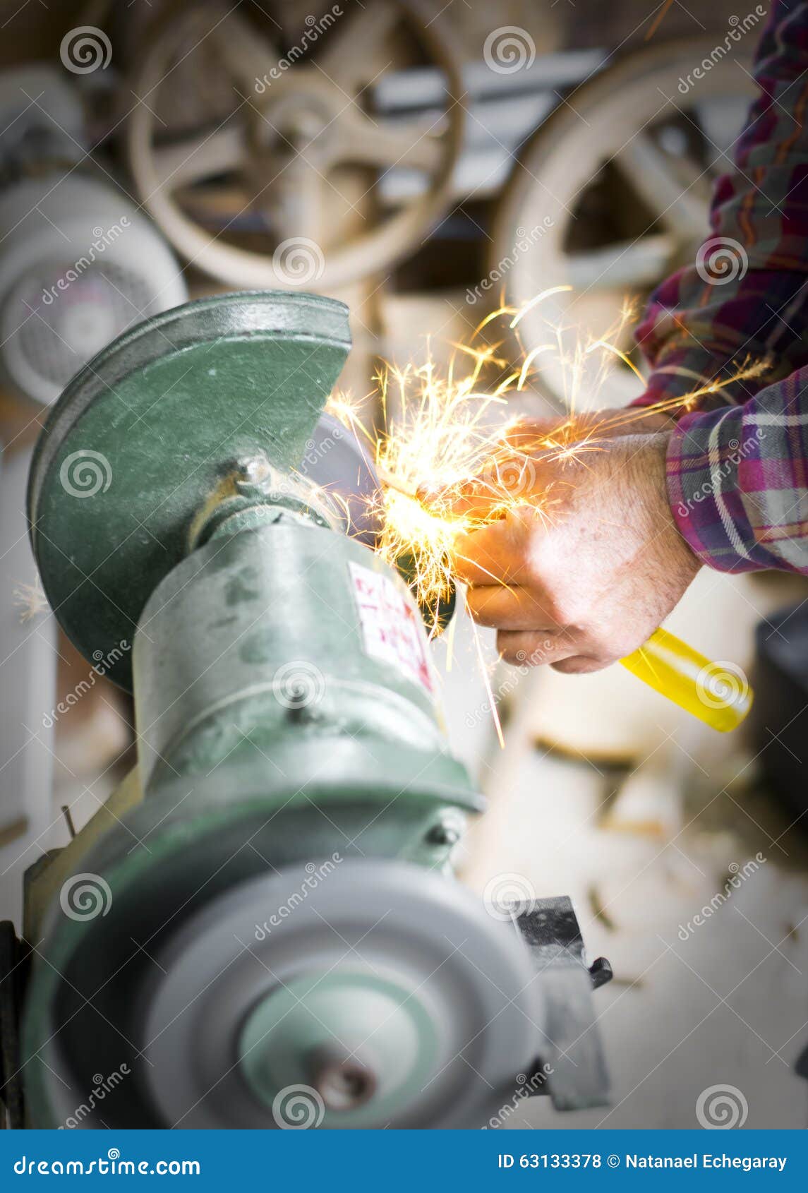 Man sharpening tool stock photo. Image of home, build - 63133378