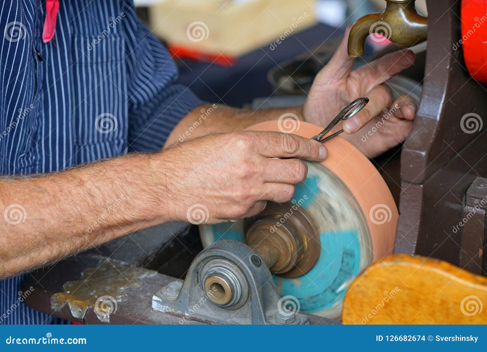 The Man Sharpens the Scissors Stock Photo - Image of grindstone, grind ...
