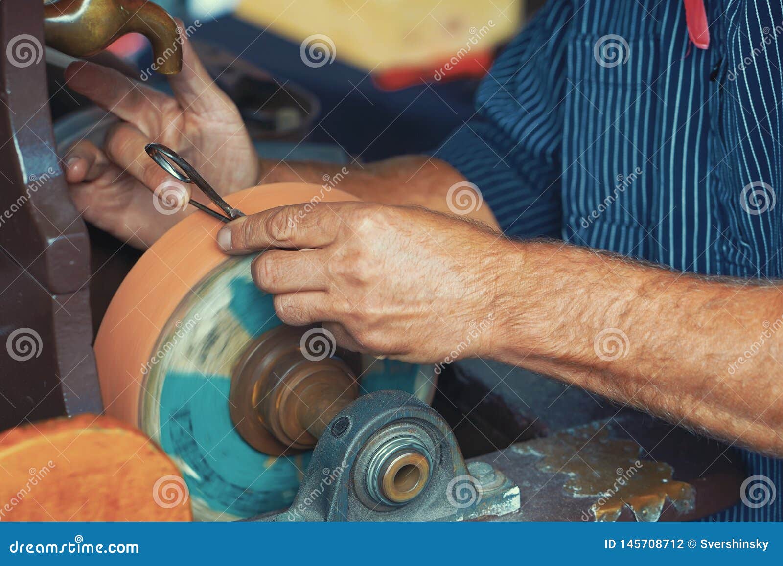 The Man Sharpens the Scissors Stock Photo - Image of blade, hand: 145708712