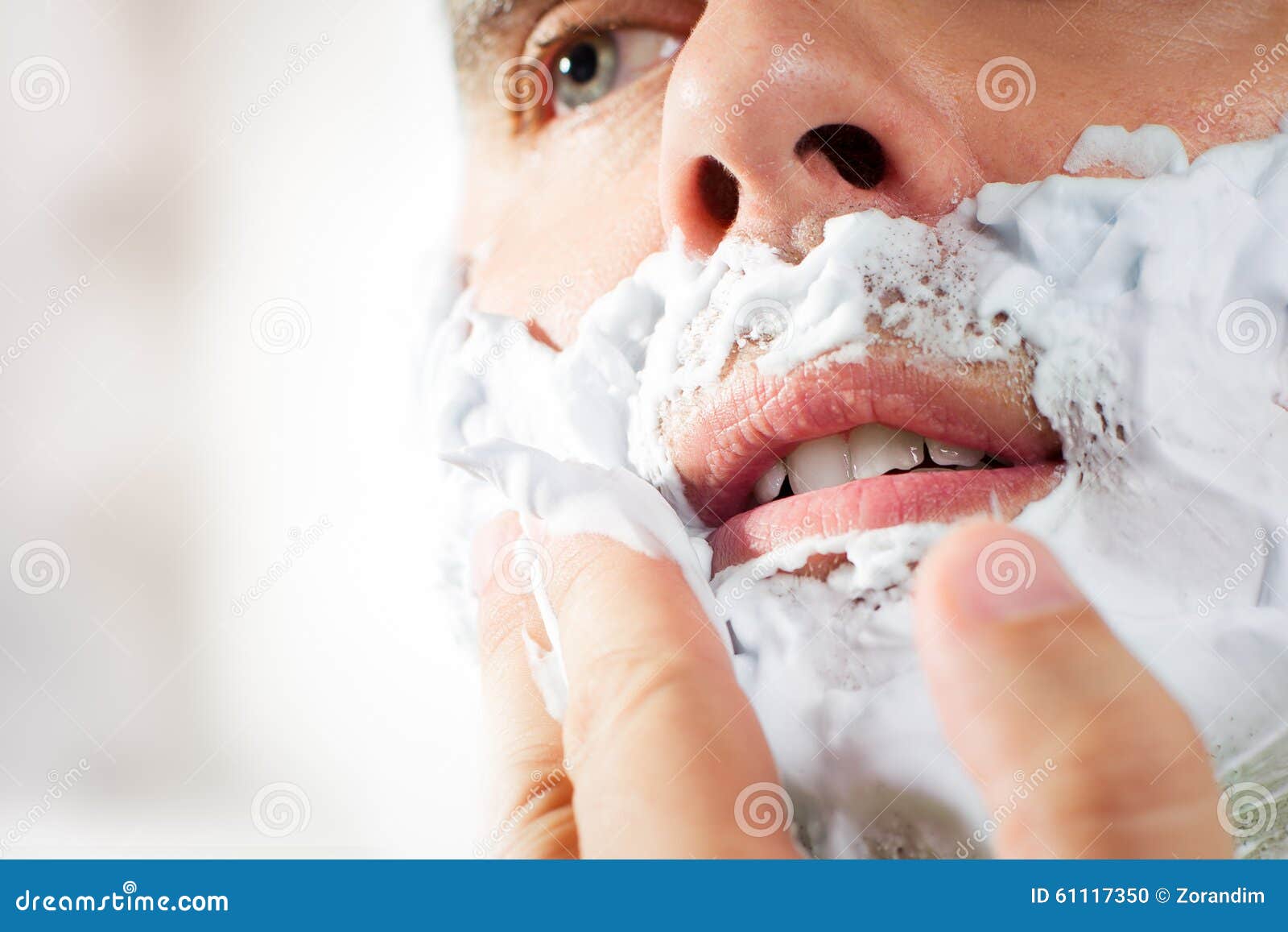 Man shaves his face stock photo. Image of caucasian, cosmetics - 61117350