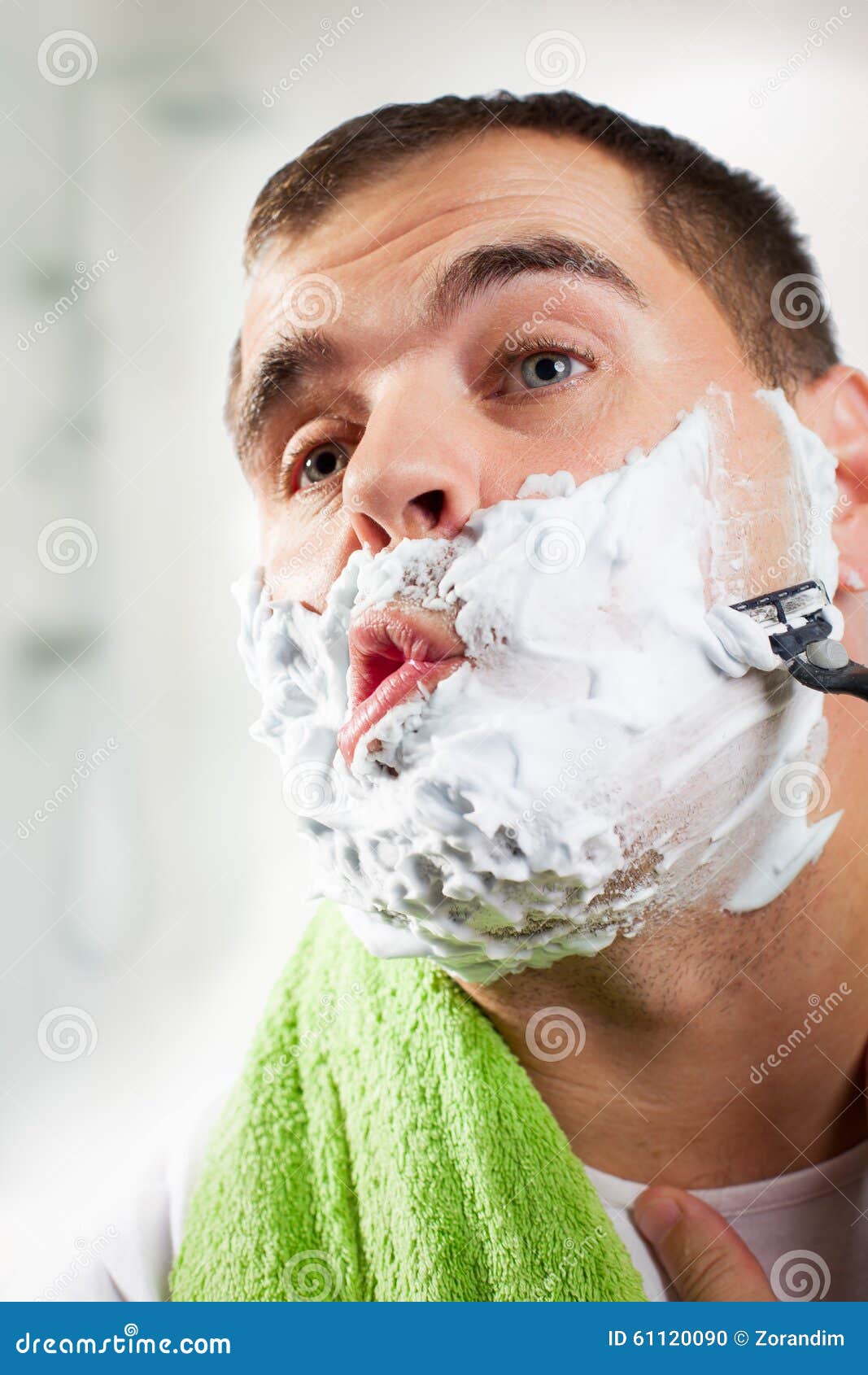 Man shaves his face stock photo. Image of skin, adult - 61120090