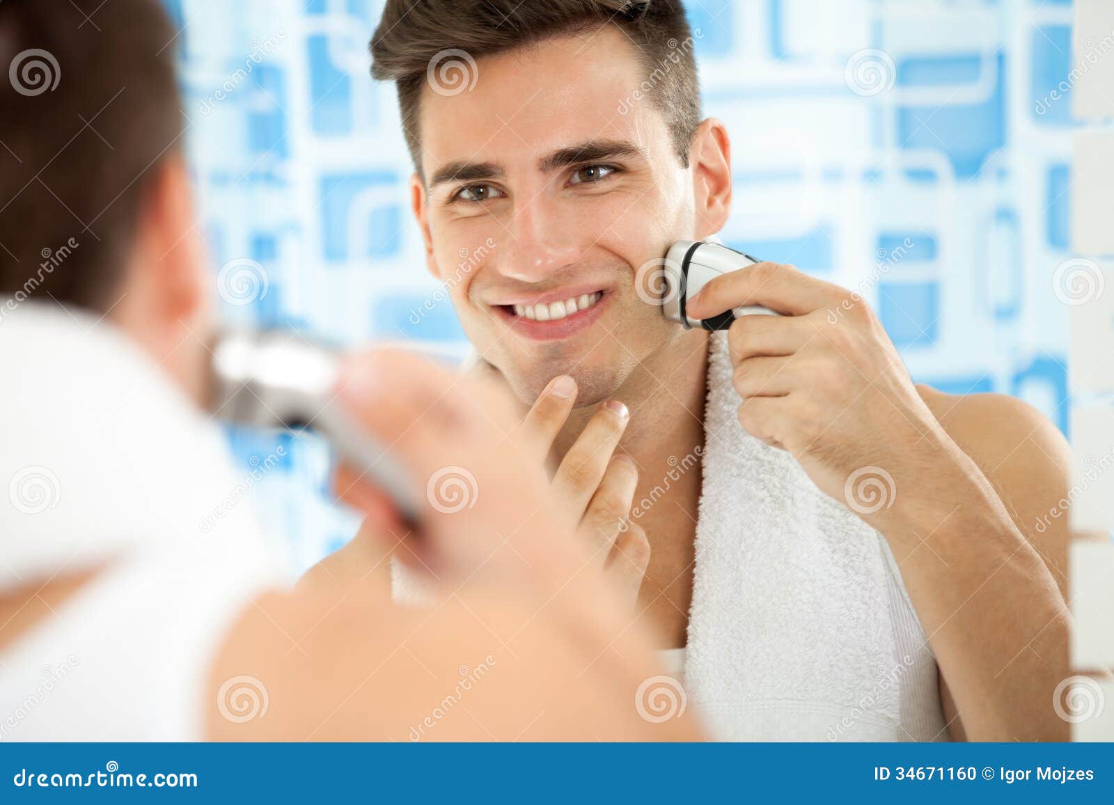 Man Shaving with Electric Shaver Stock Photo - Image of mirror ...