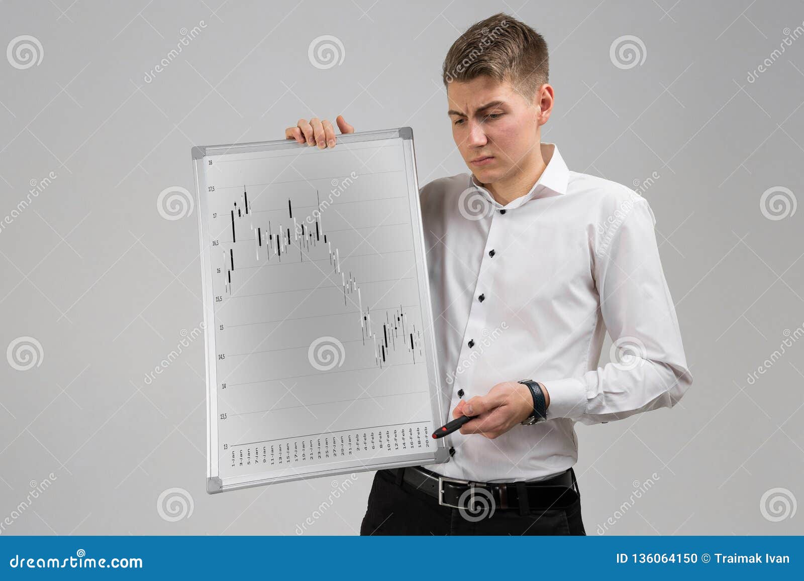 Young Man Holding a Poster with Statistics Isolated on a Light ...