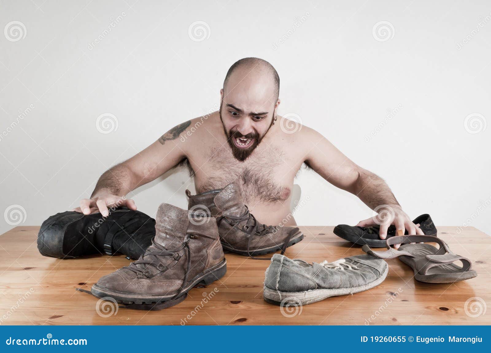 Man and Shoes on the Table Conceptual Stock Image - Image of madness ...