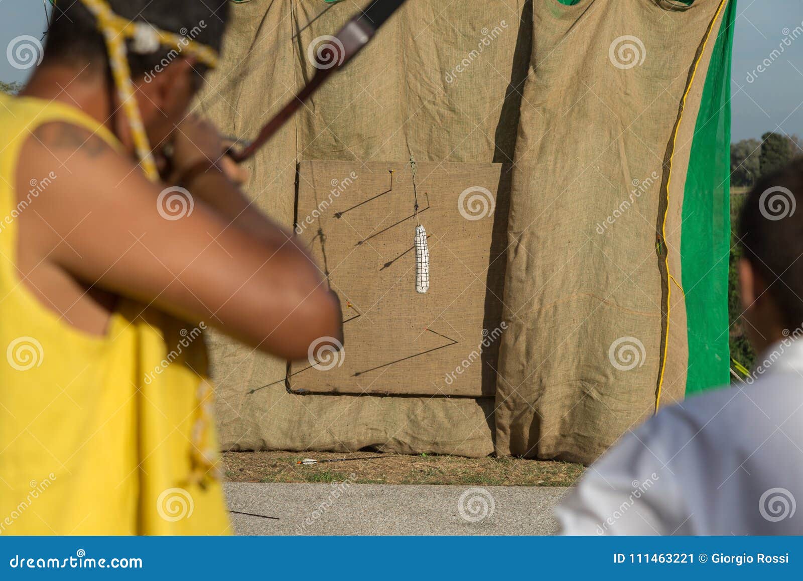 Man Shooting Arrow on Target, Training with the Bow Editorial Photo ...