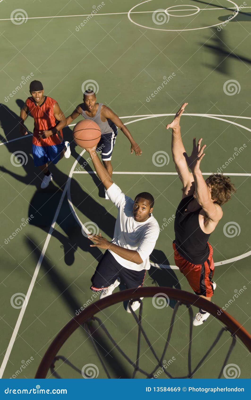 Man shooting basketball stock image. Image of aspirations - 13584669