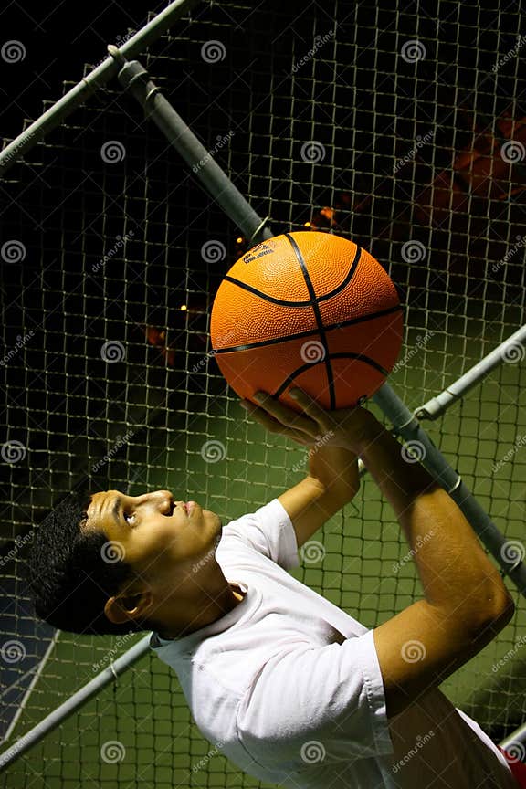 Man shooting basketball stock photo. Image of courts, active - 5742646