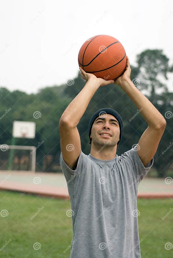 Man Shooting Basketball - Vertical Stock Photo - Image of happiness ...