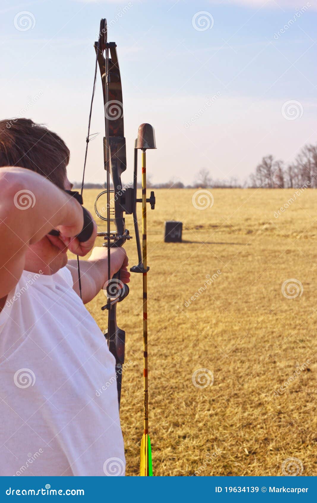 Man shooting bow stock image. Image of safety, compound - 19634139