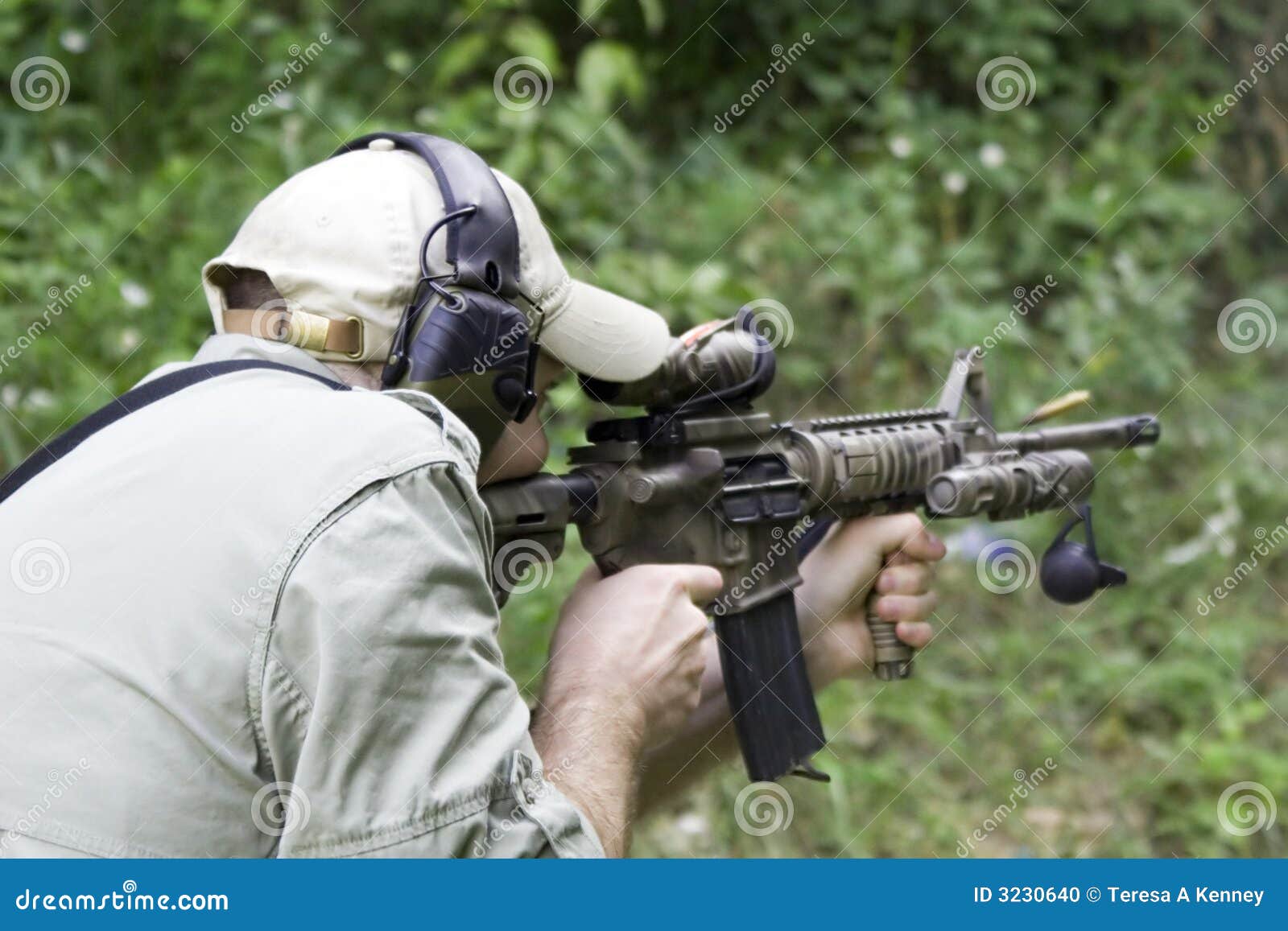 Man Shooting Carbine stock photo. Image of action, carbine - 3230640