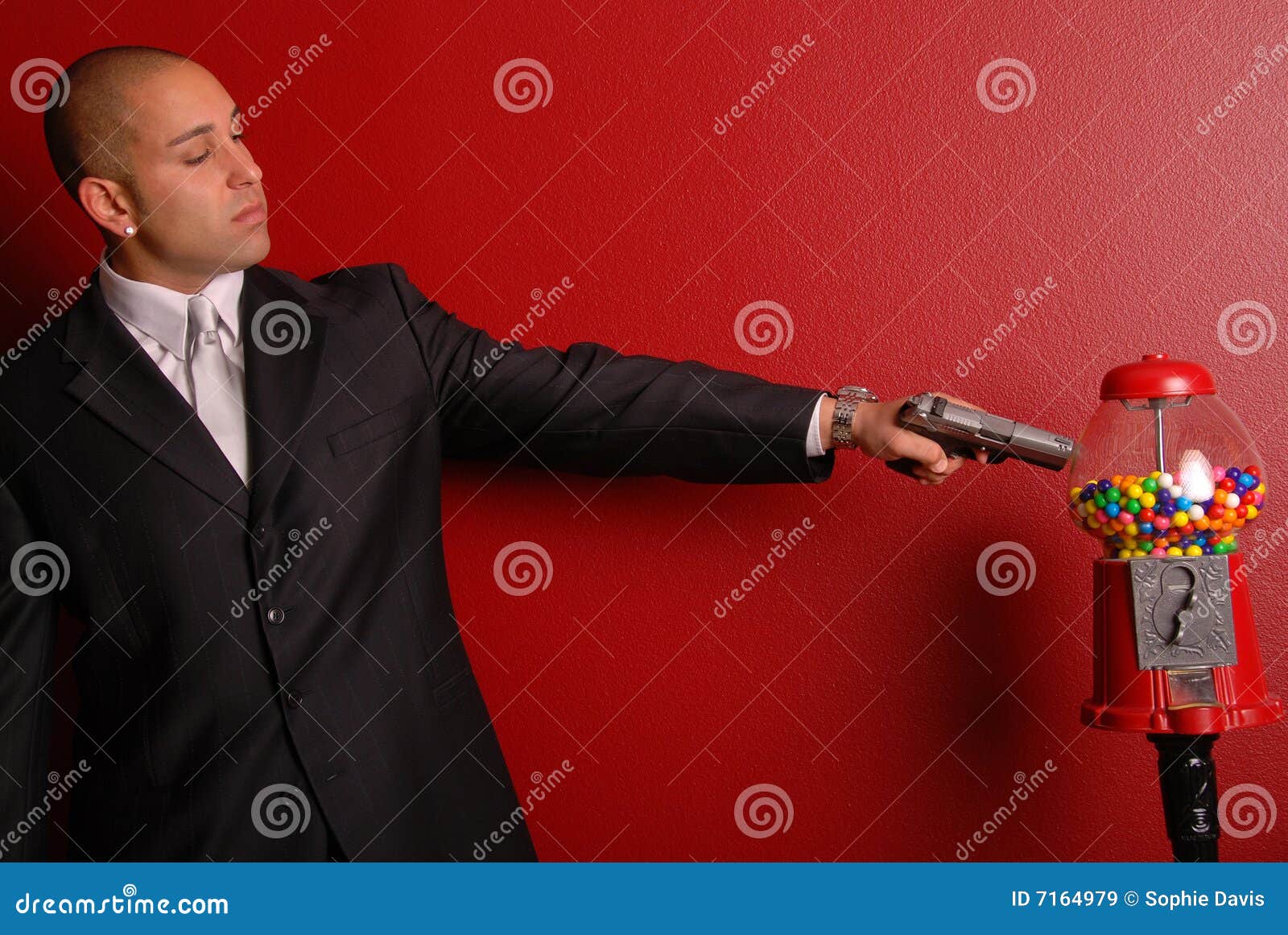Man Shooting Gumball Machine Stock Image - Image of gumball, danger ...