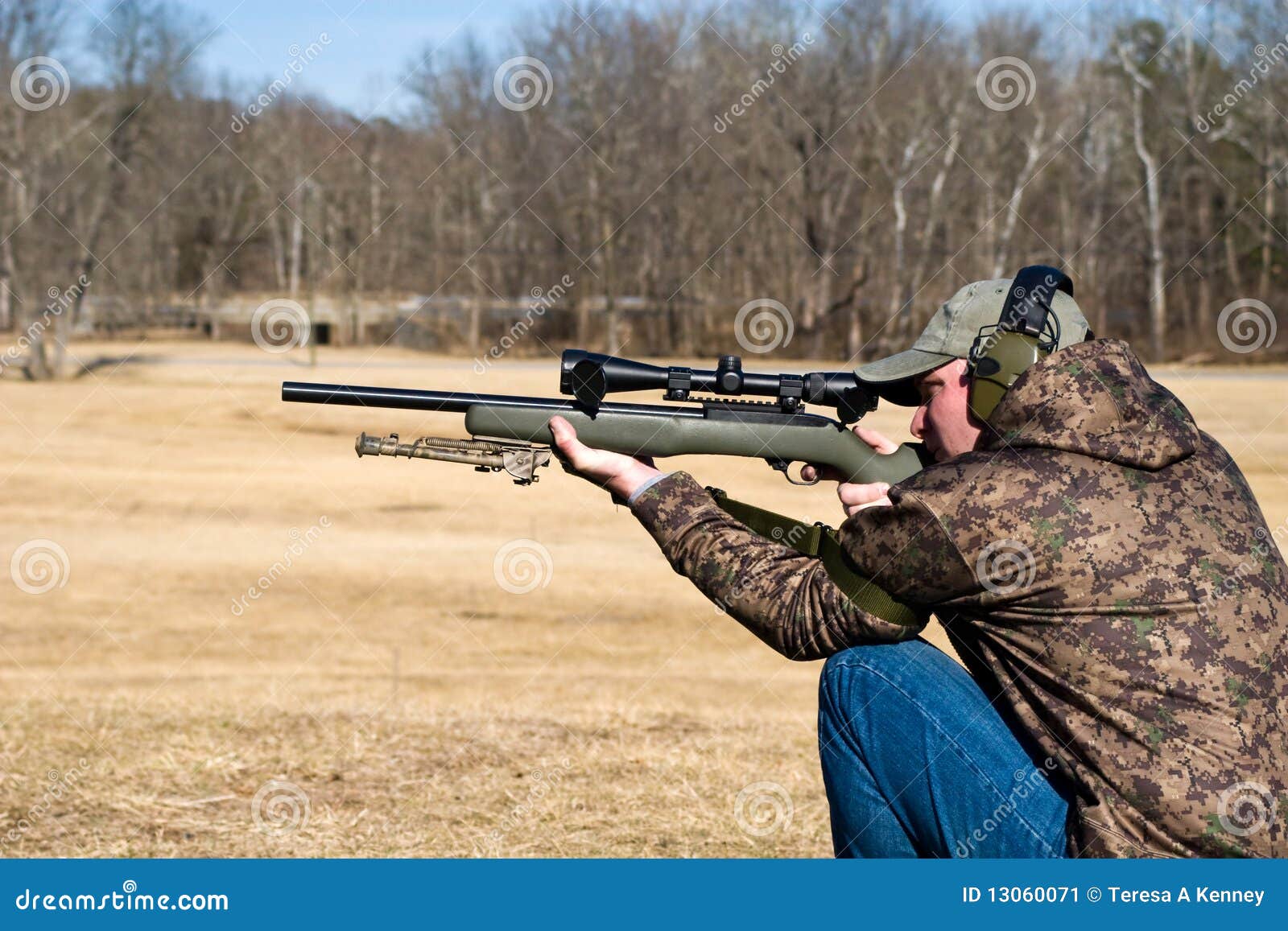 Kneeling Rifle Hunter Shooting In Sunset Stock Photography ...