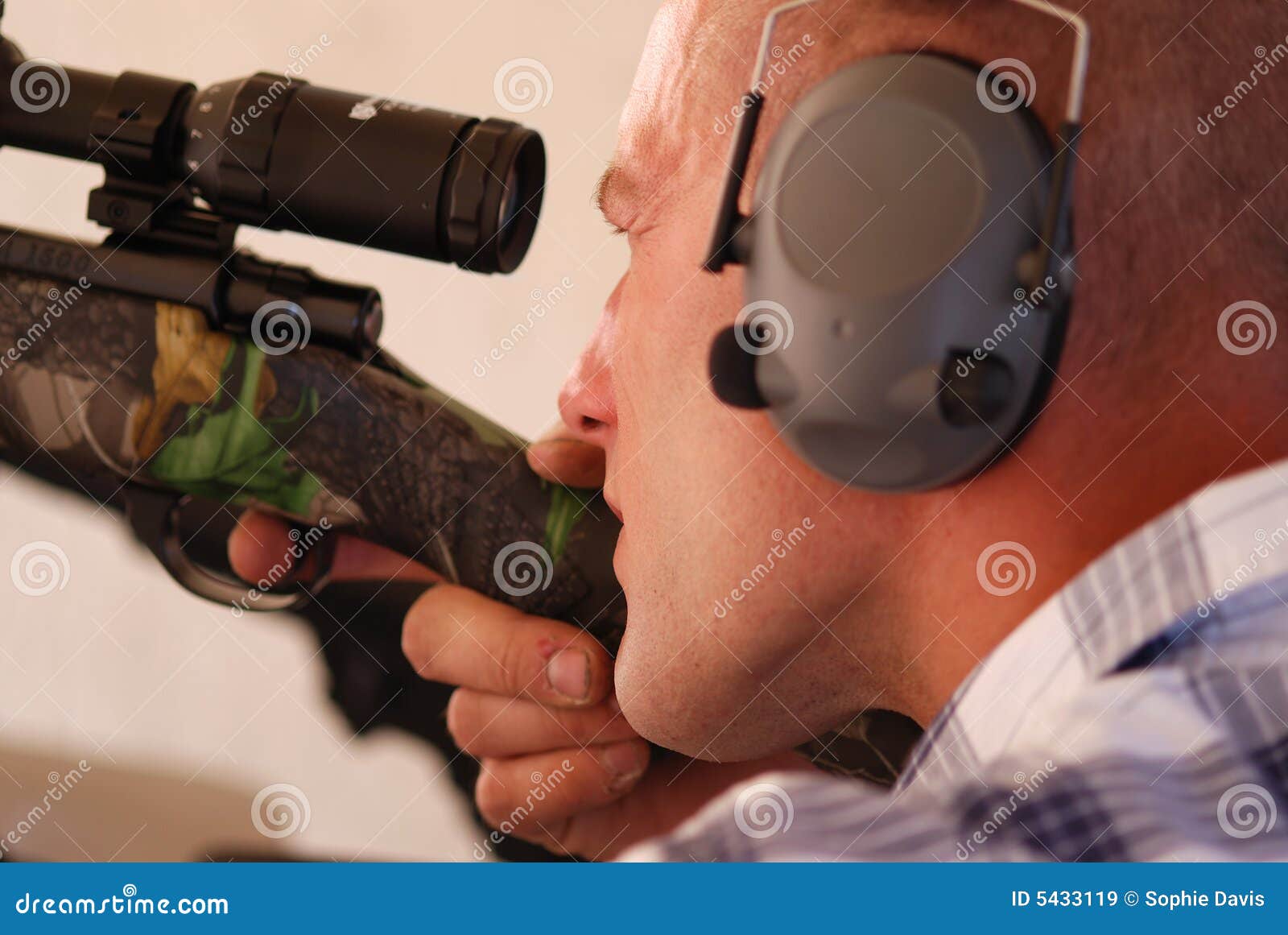 Man shooting rifle. stock image. Image of shot, danger - 5433119