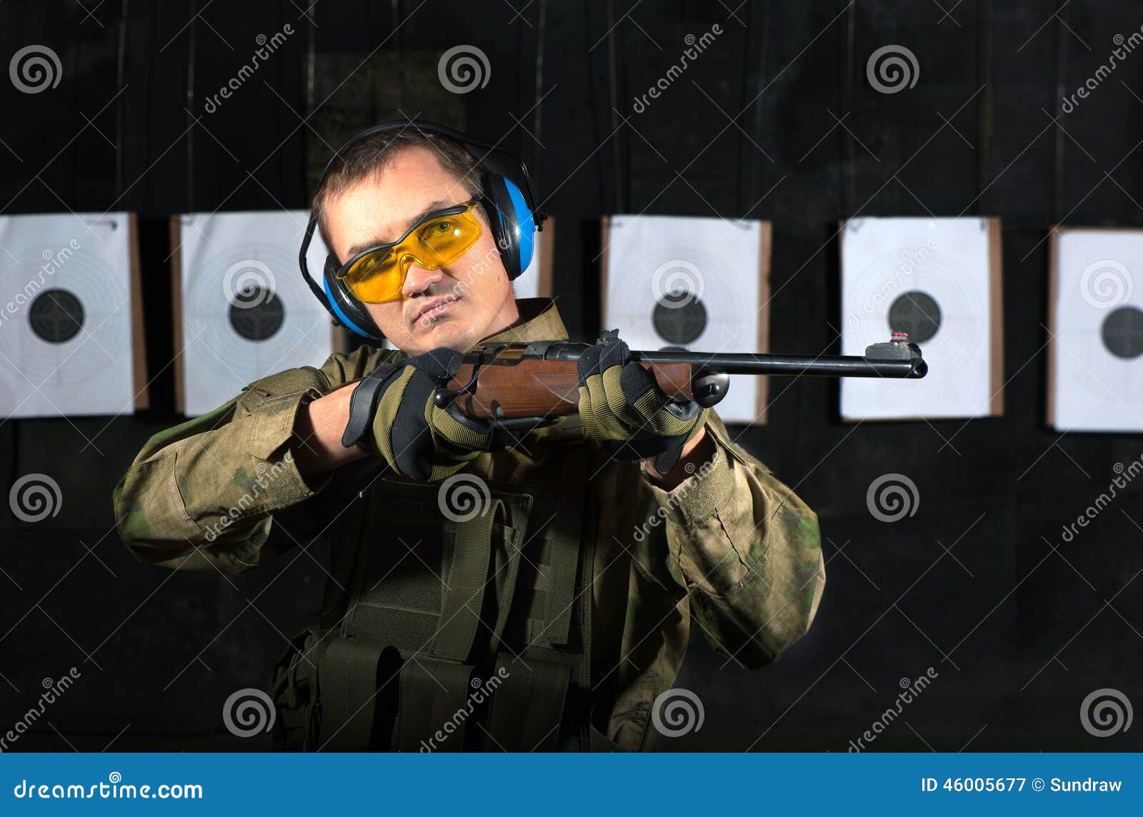 Man shooting stock image. Image of ammunition, aiming - 46005677