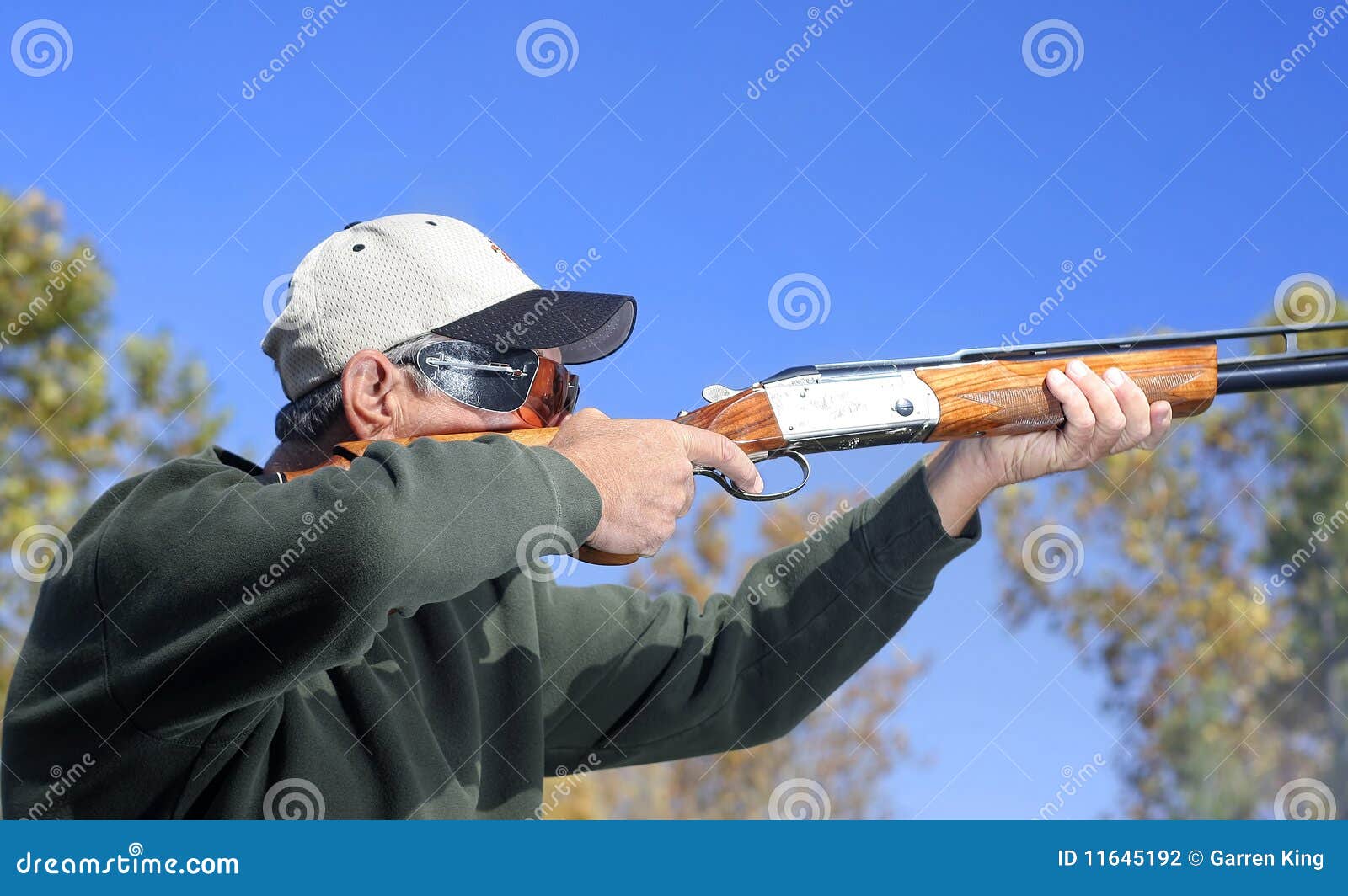 Man Shooting Shotgun stock photo. Image of skeet, male - 11645192