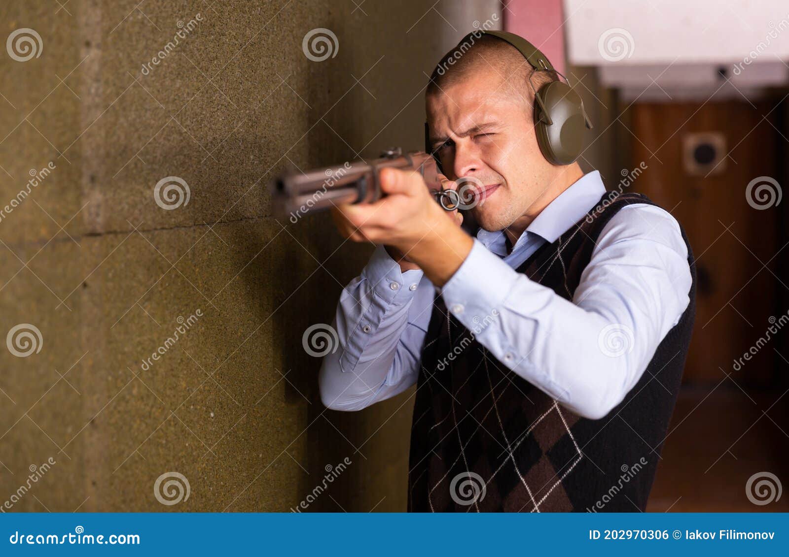 Man Shoots a Double-barreled Gun at Shooting Range Stock Photo - Image ...