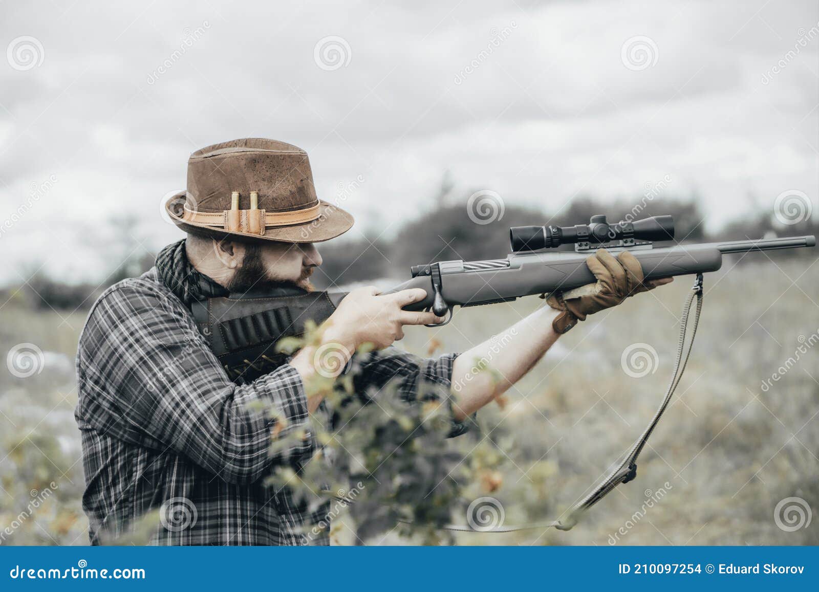 Man Shoots a Rifle. Bearded Man with Scout Rifle Stock Photo - Image of ...