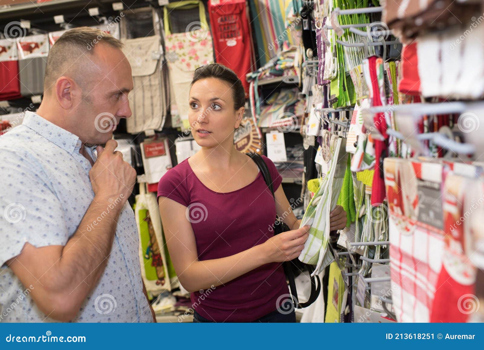 Man with Shop Assisant in Store Stock Image - Image of merchandiser ...