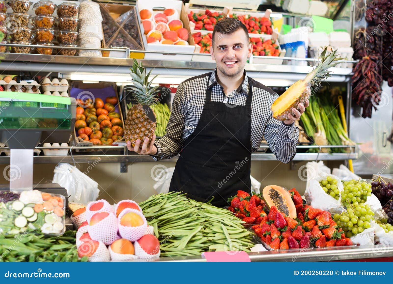 Man Shop Assistant is Displaying Assortment Stock Photo - Image of ...