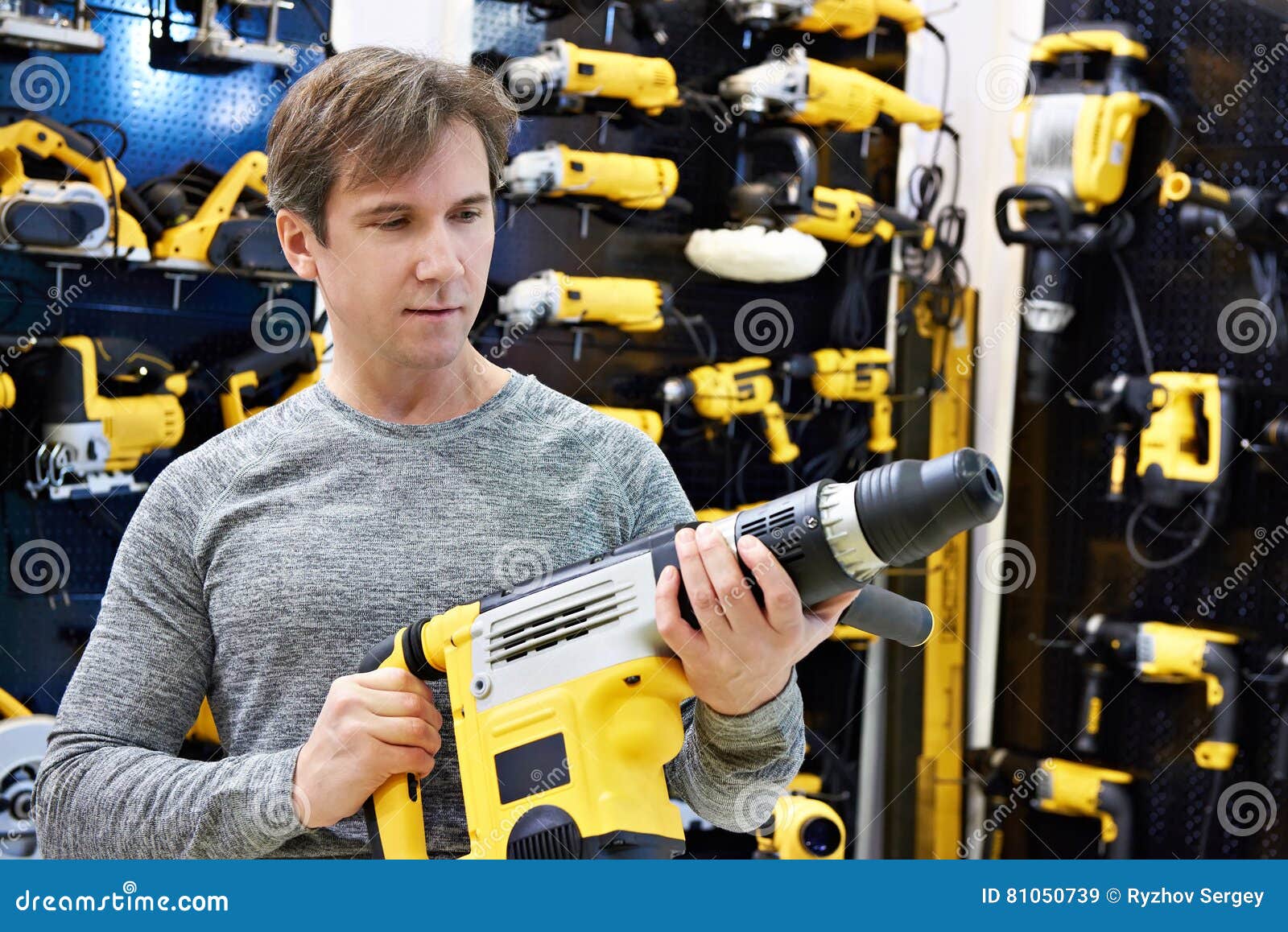 Man Shopping for Hammer Drill in Hardware Store Stock Image - Image of ...