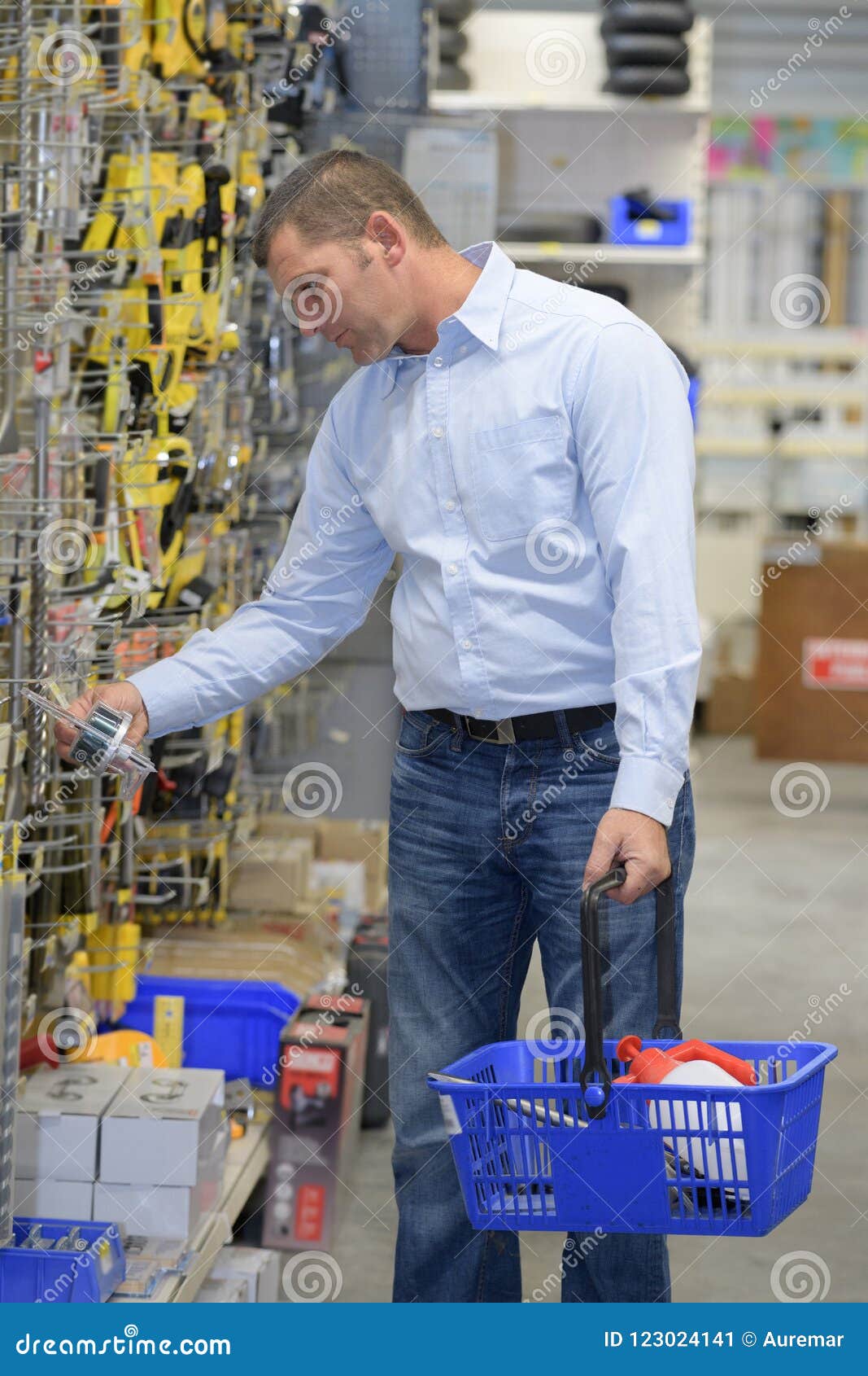 Man Shopping in Hardware Store Stock Image - Image of store, standing ...