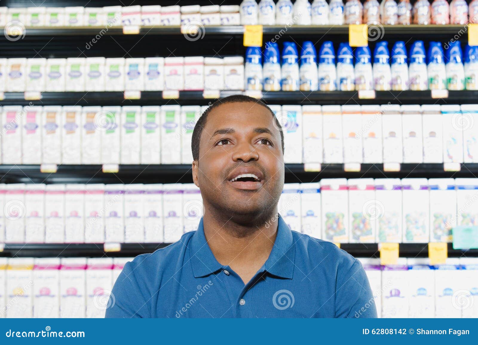 Man Shopping in a Supermarket Stock Photo - Image of elation, leisure ...