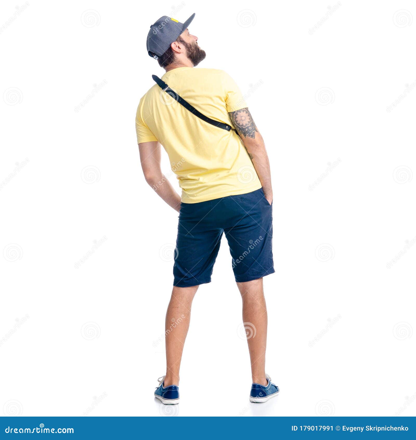 Man in Shorts and Cap Standing Looking Stock Image - Image of back ...