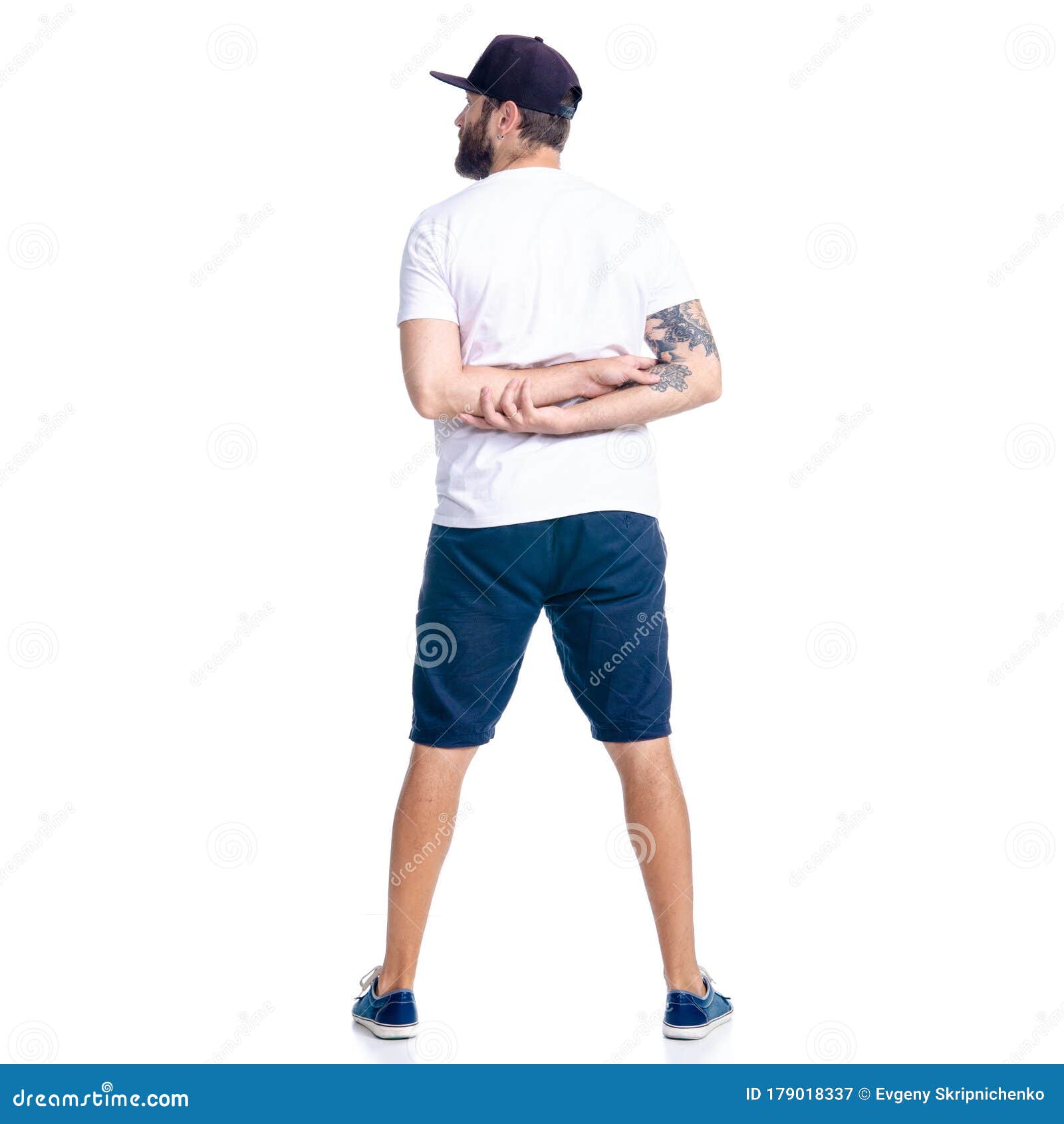 Man in Shorts and Cap Standing Looking Stock Image - Image of clothes ...