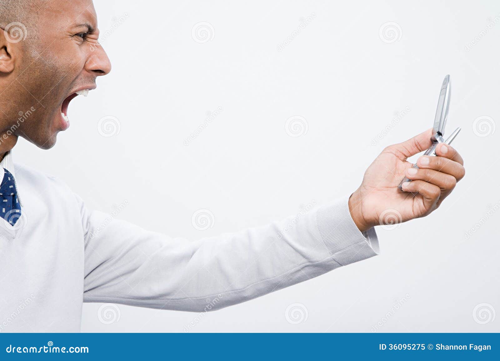 A Man Shouting at a Cell Phone Stock Image - Image of clerks ...