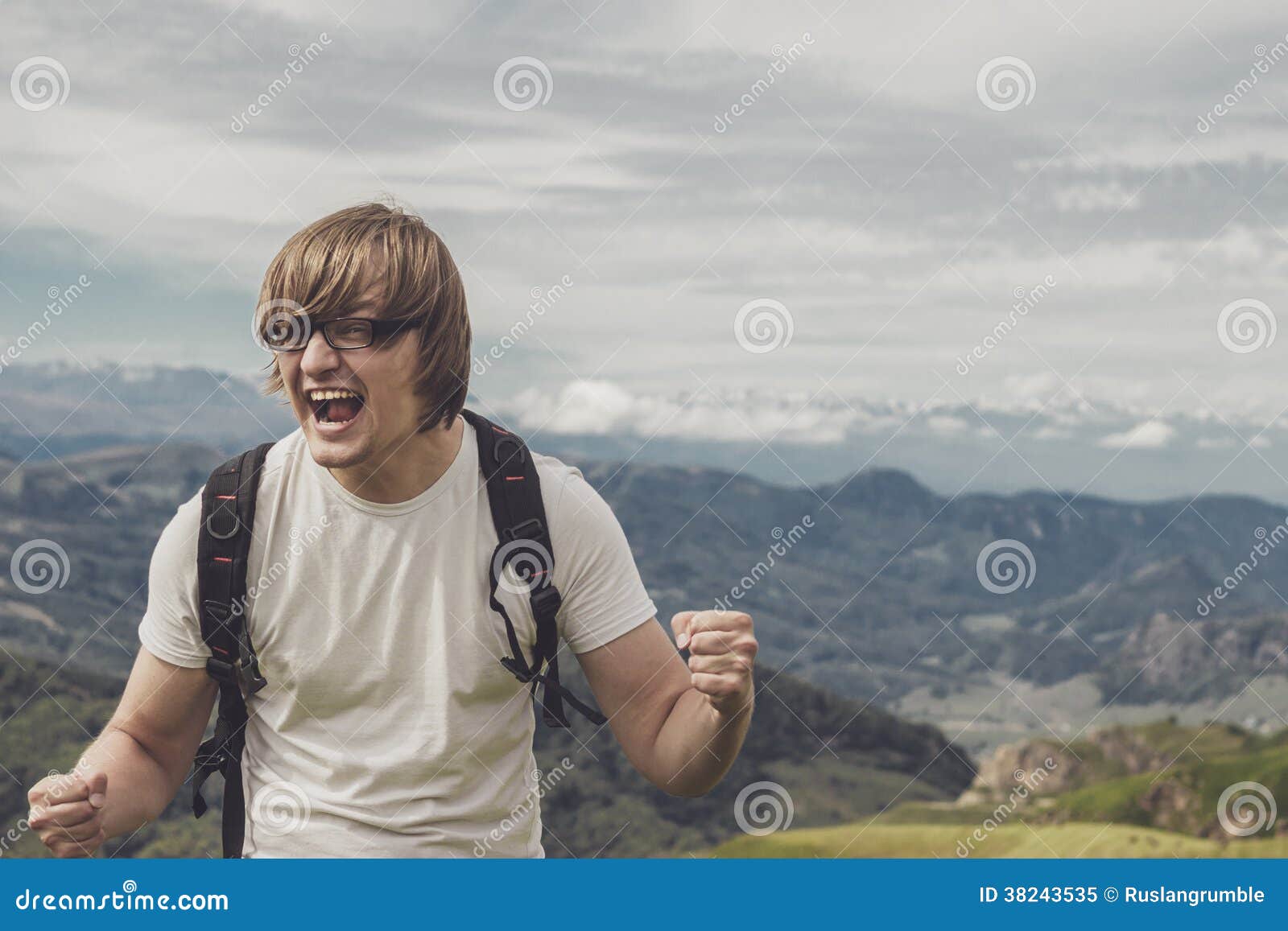 Man Shouting at the Mountain Top Stock Image - Image of glasses, grass ...