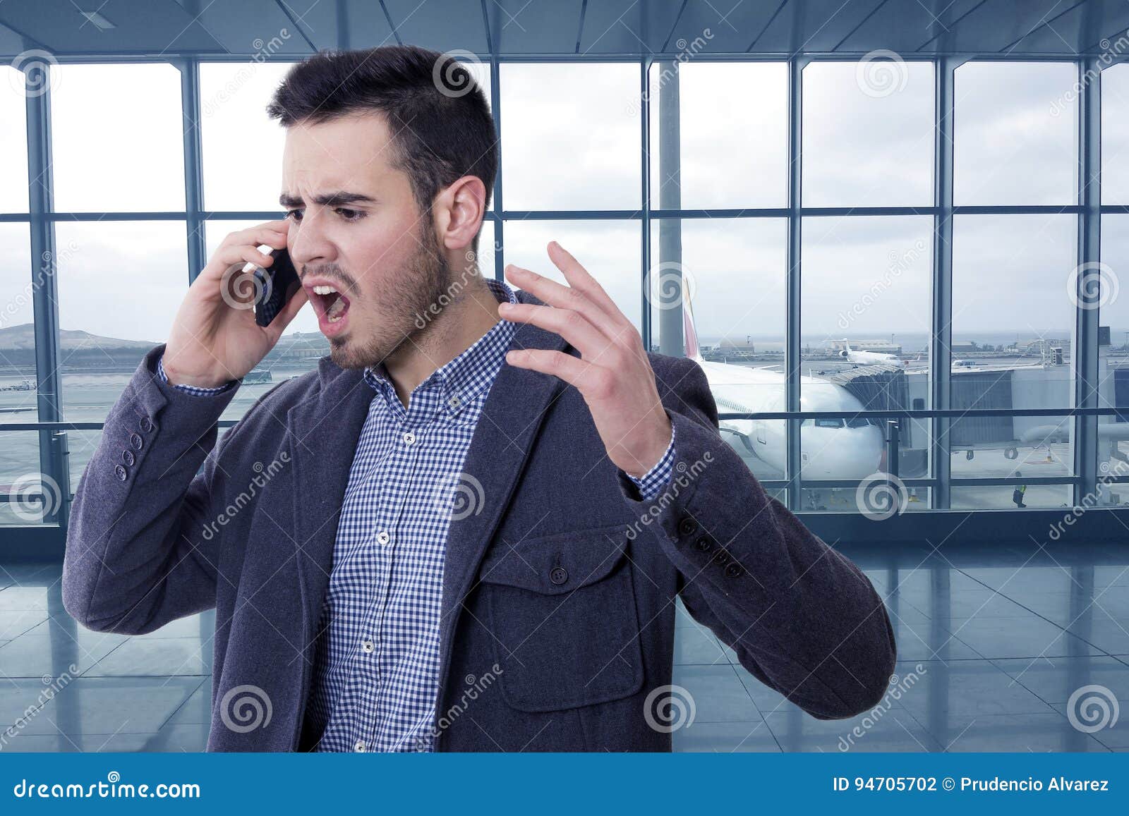 Man shouting by the phone stock photo. Image of enthusiasm - 94705702