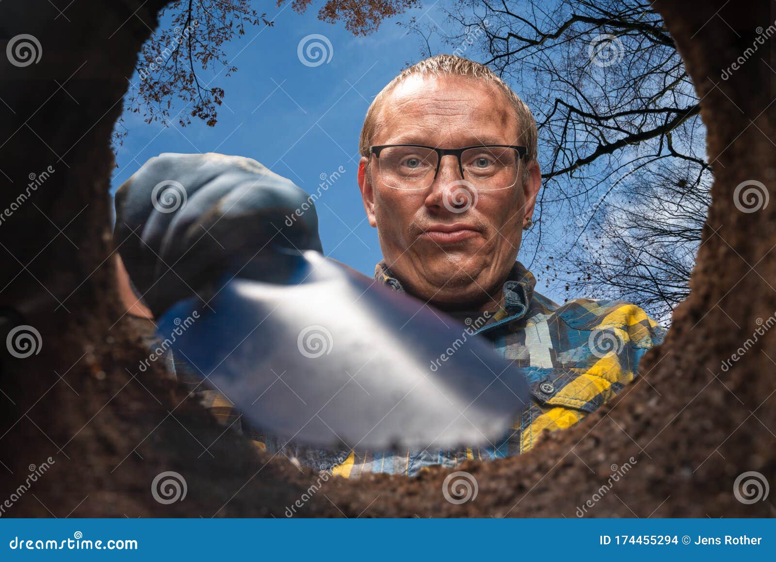 Man with a Shovel Digs a Hole Bottom View Stock Photo - Image of body ...