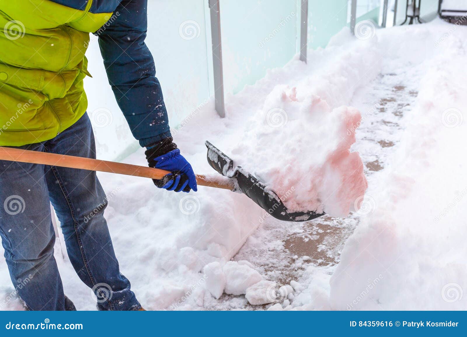Man Shoveling the Show on the Terrace Stock Photo - Image of apartment ...
