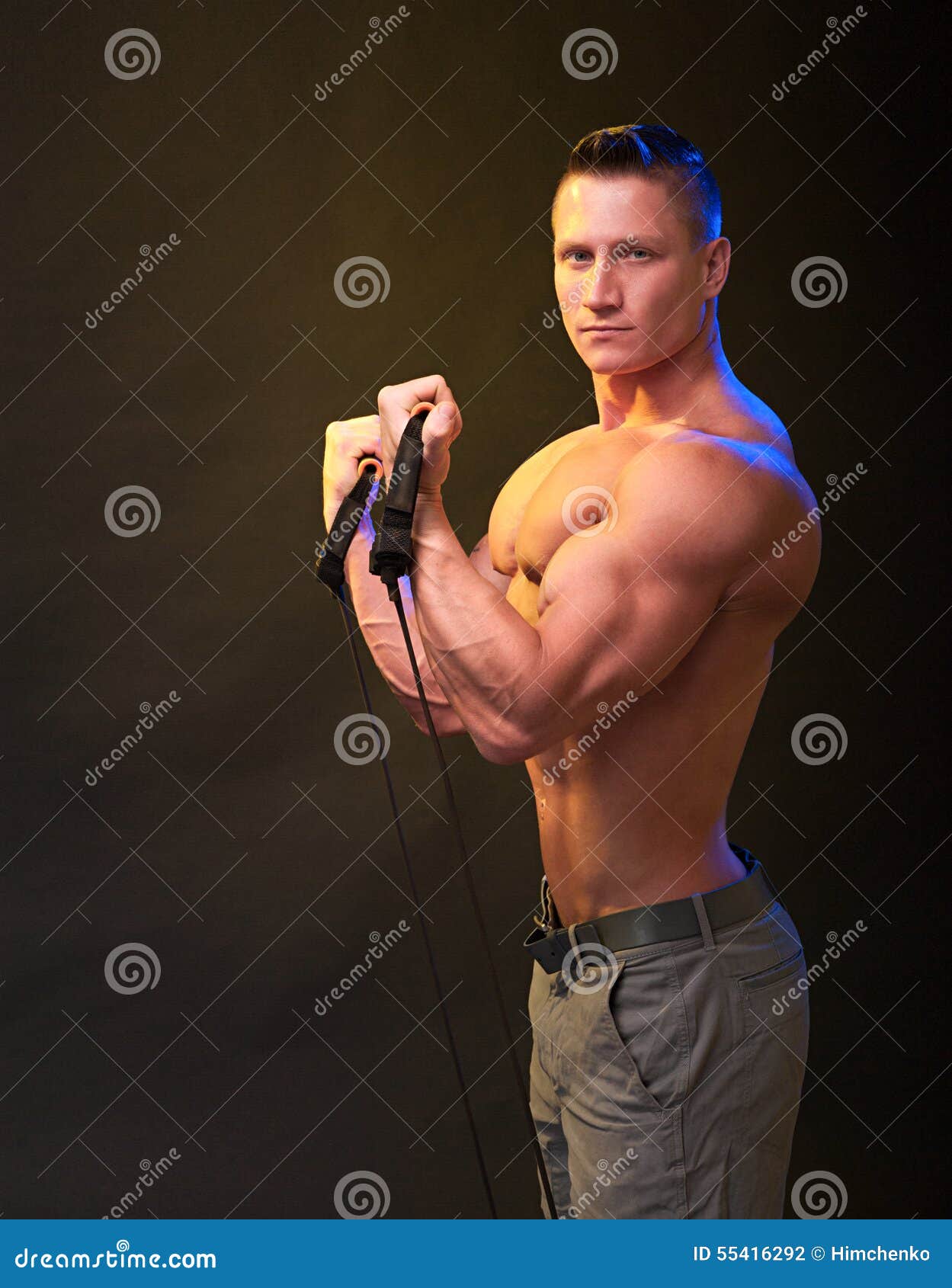 Man showing biceps muscle stock photo. Image of showing - 55416292