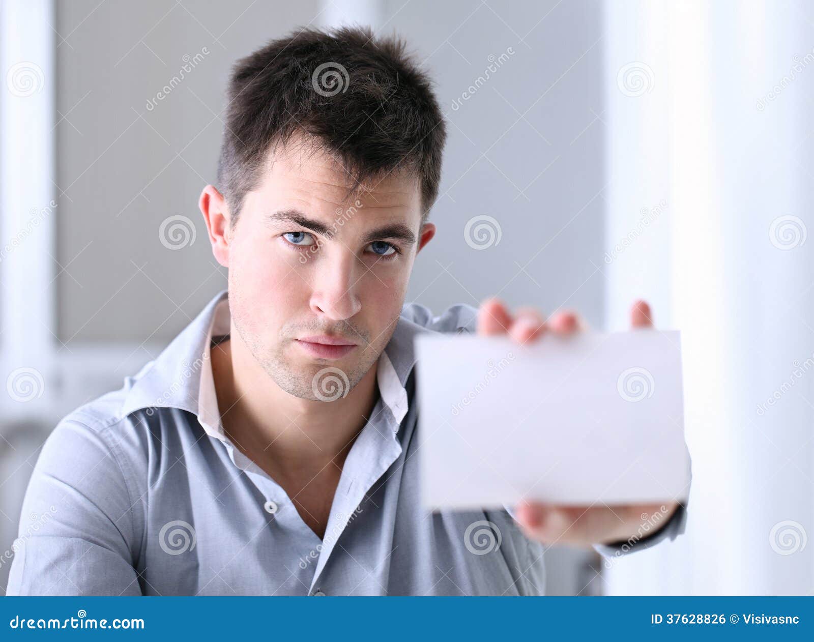 Man Showing a Business Card Stock Photo - Image of identity, blue: 37628826
