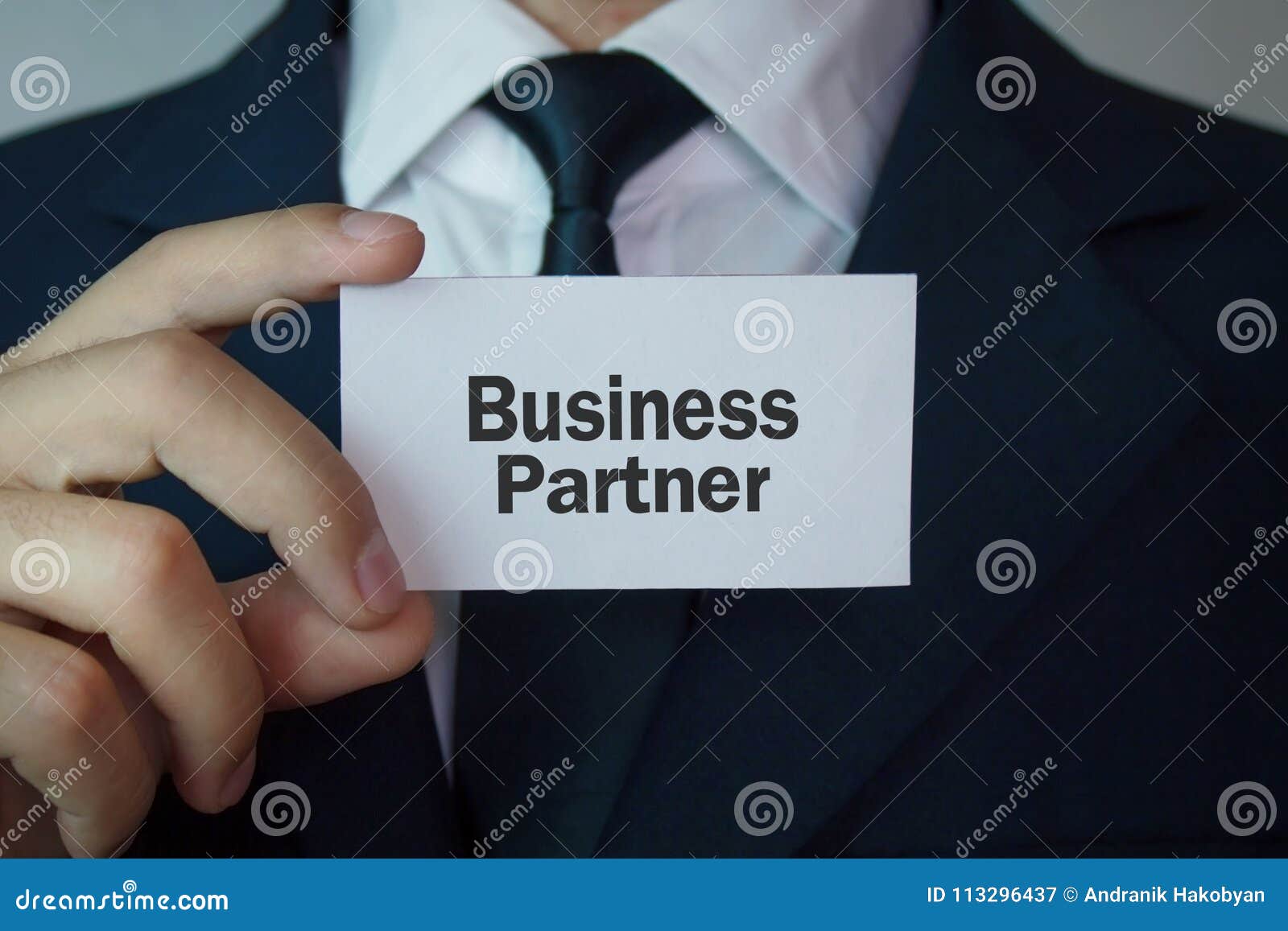 Man Showing Business Partner Word on Business Card. Business Stock ...