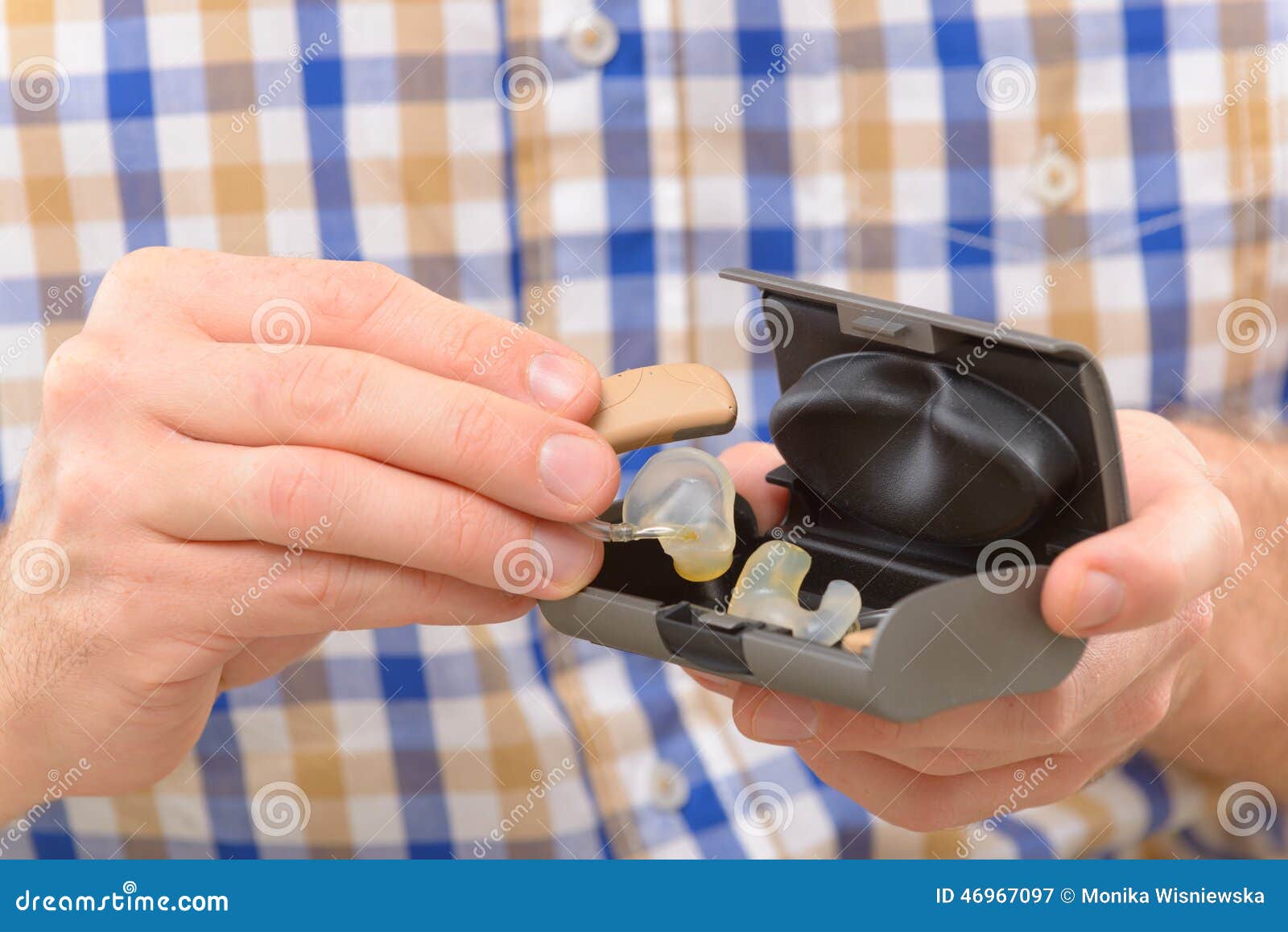 Man showing deaf aids stock image. Image of choose, healthcare - 46967097