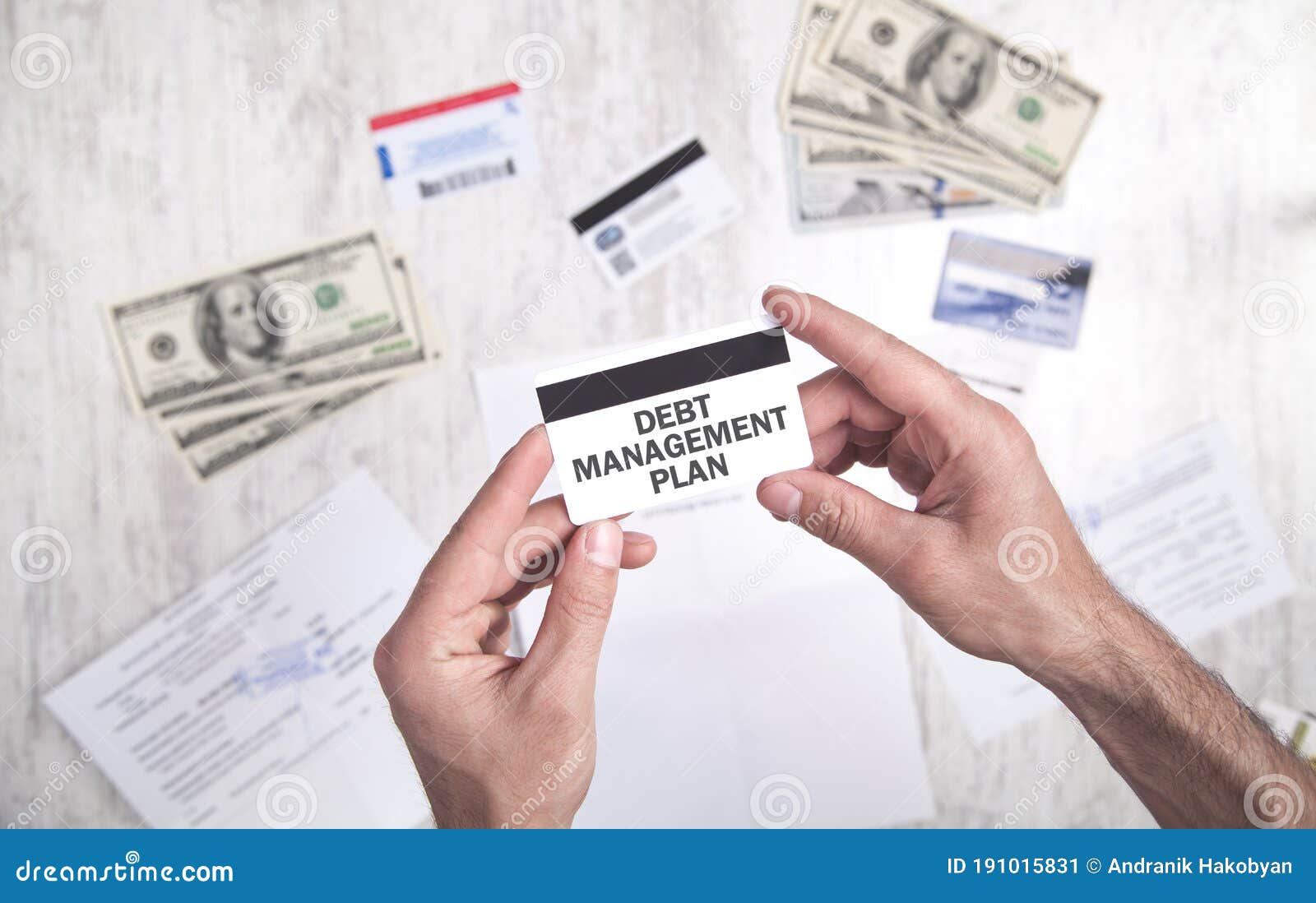 Man Showing Debt Management Plan Text on Credit Card Stock Image ...