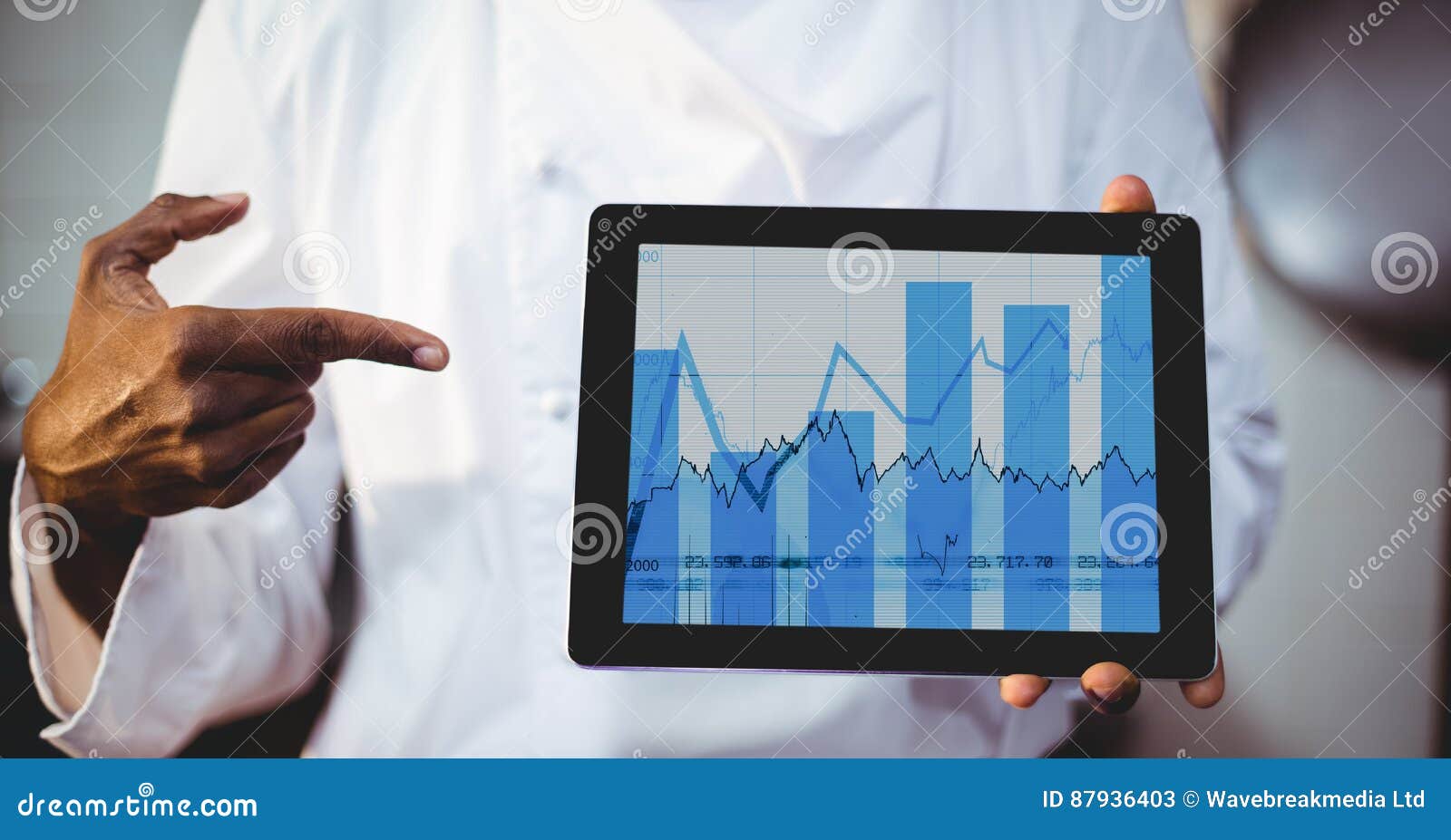 Man Showing Digital Tablet Displaying Graph Chart on Screen Stock Image ...