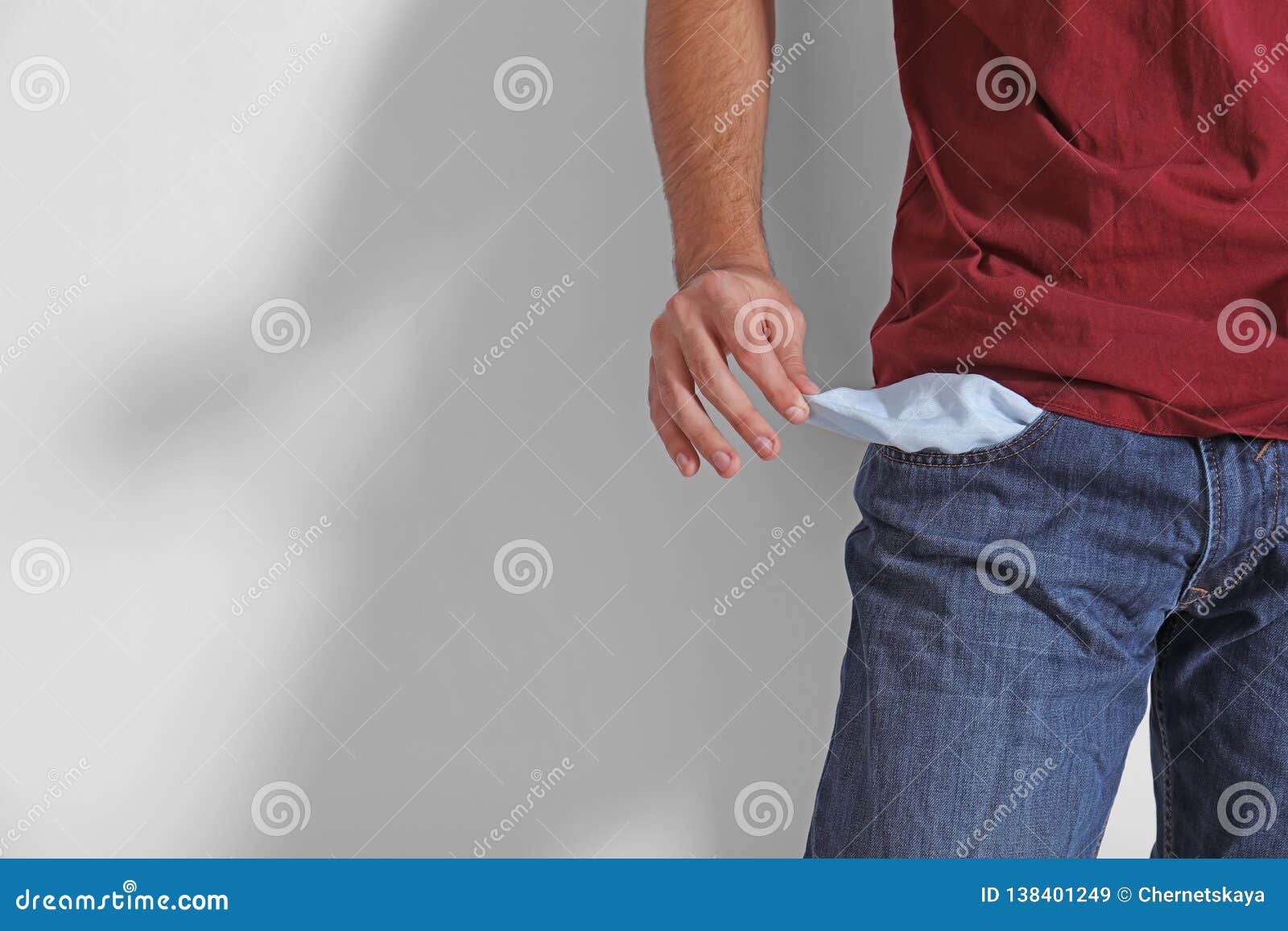 Man Showing Empty Pocket on Light Background, Closeup Stock Image ...