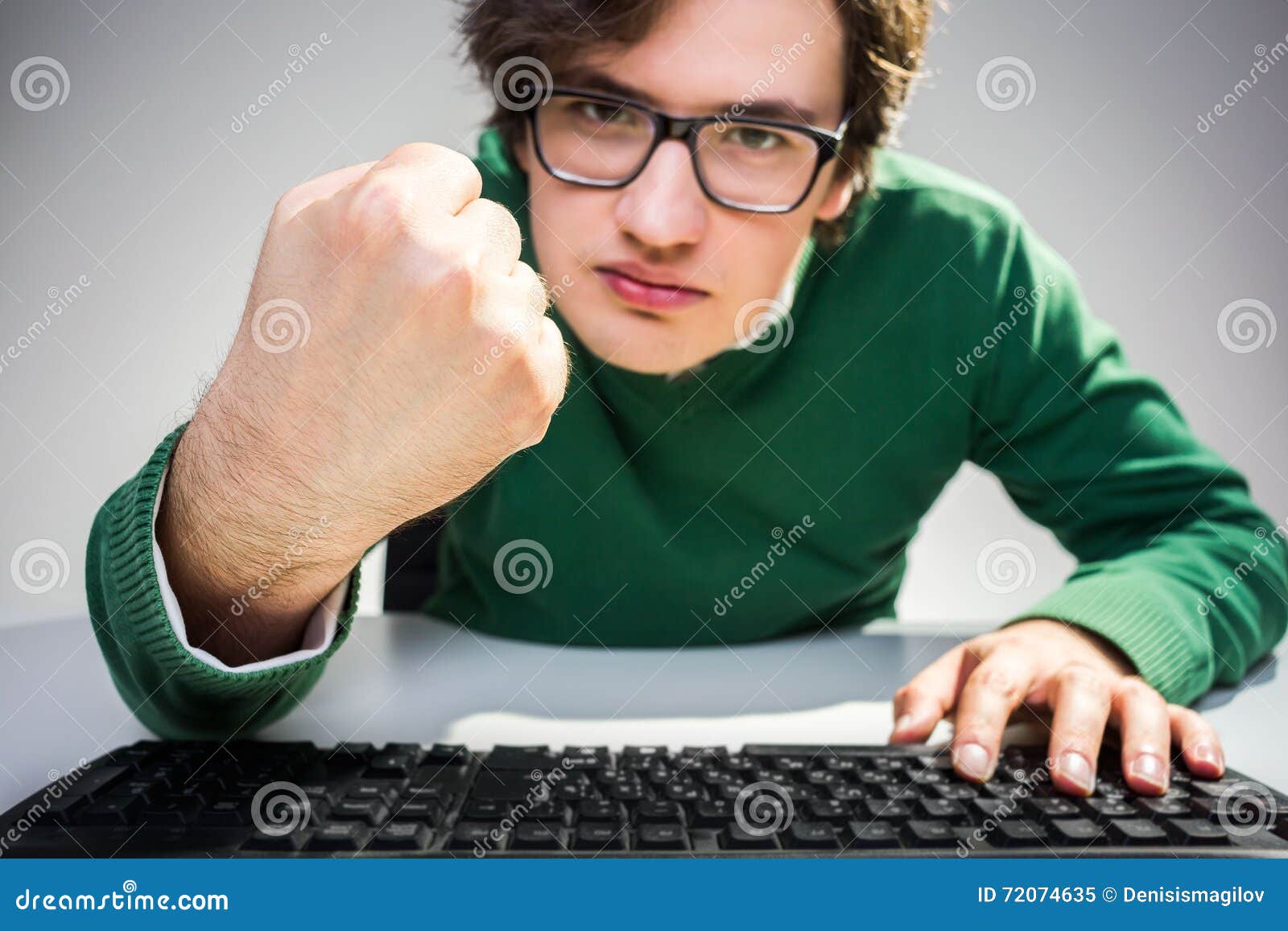 Man showing fist stock image. Image of keyboard, face - 72074635