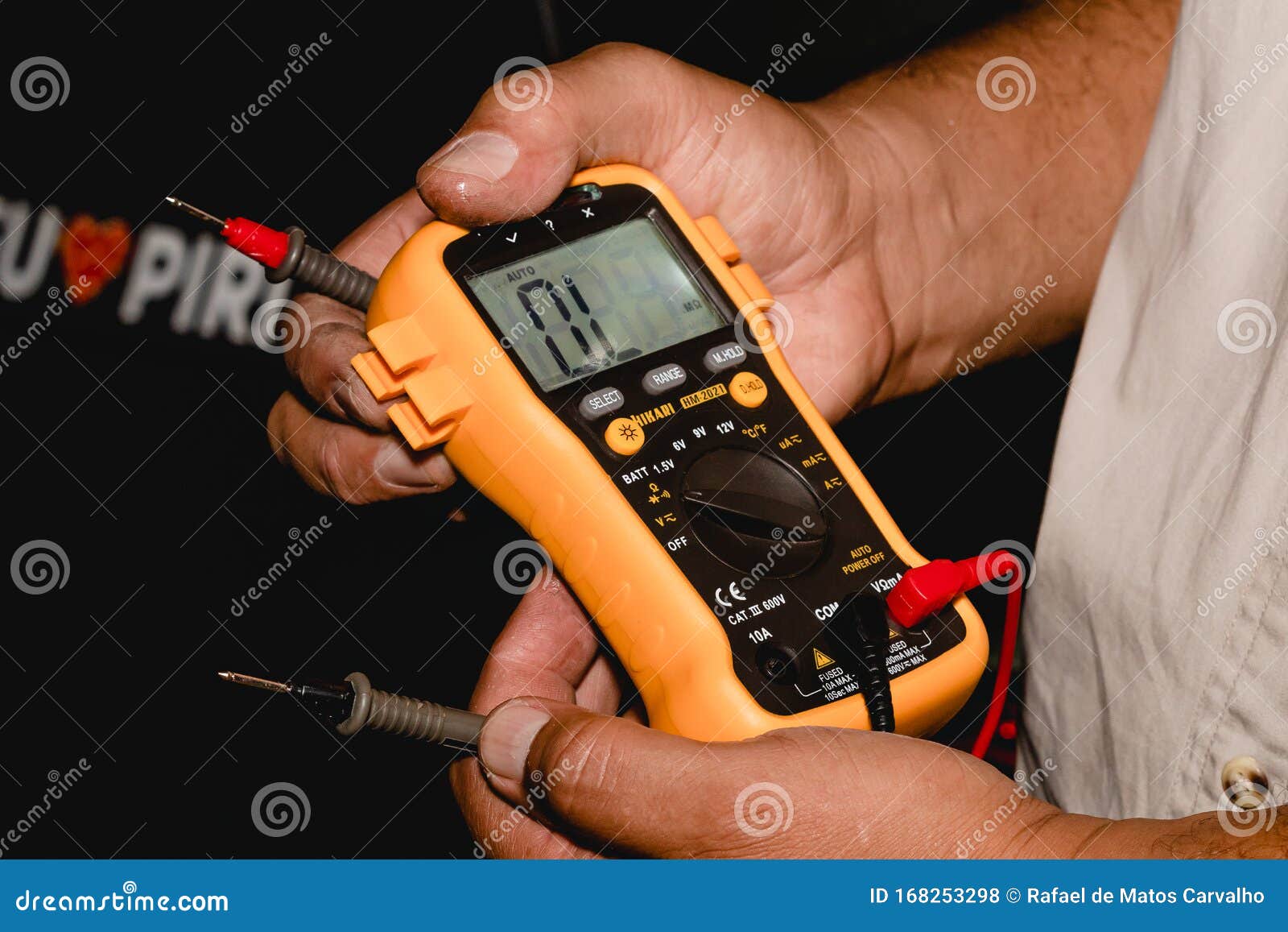 Man showing a multimeter. editorial stock photo. Image of person ...