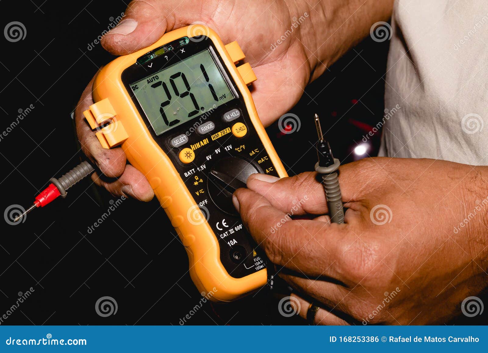 Man showing a multimeter. editorial photo. Image of maintenance - 168253386