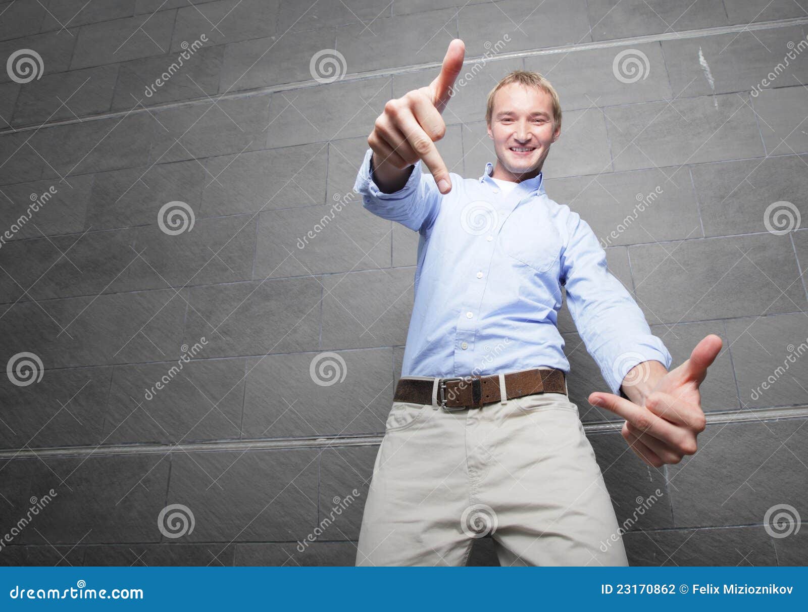 Man Showing an Obscene Gesture Stock Photo - Image of european, blue ...