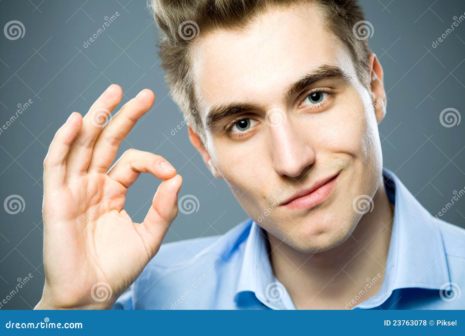 Man showing OK sign stock photo. Image of adult, studio - 23763078