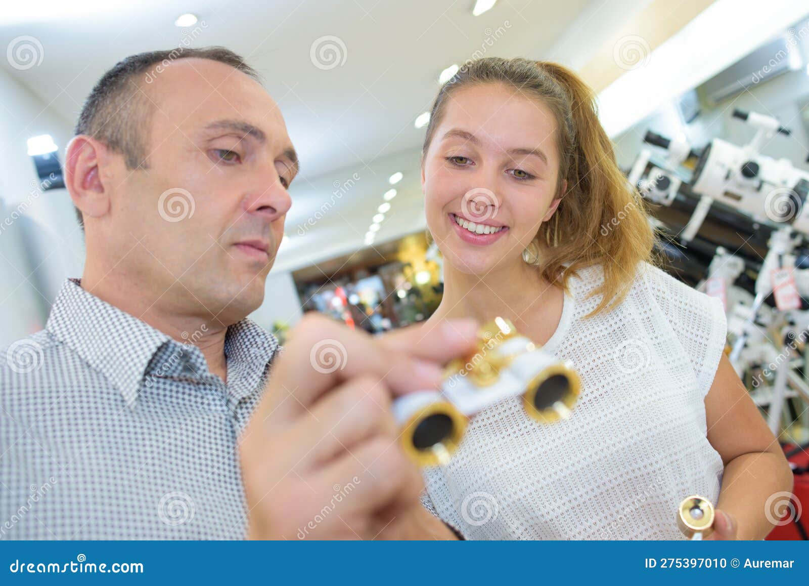 Man Showing Opera Glasses To Young Lady Stock Photo - Image of theater ...