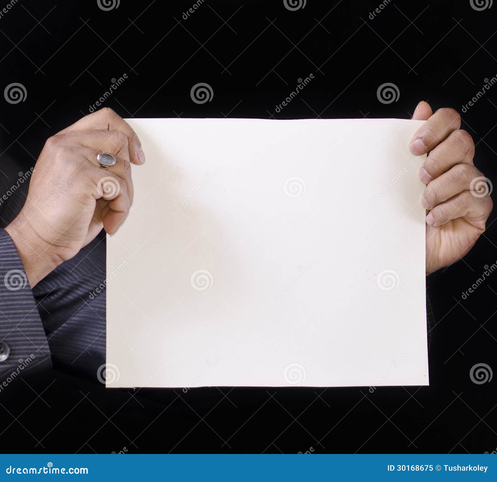 A Handsome Man Showing a Paper Stock Image - Image of businessperson ...
