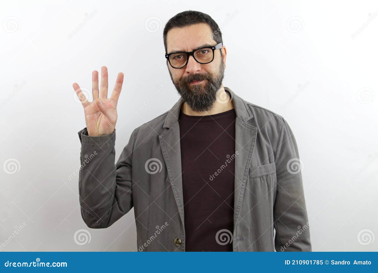 Man Showing and Pointing with Fingers Number Four with Serious Face ...