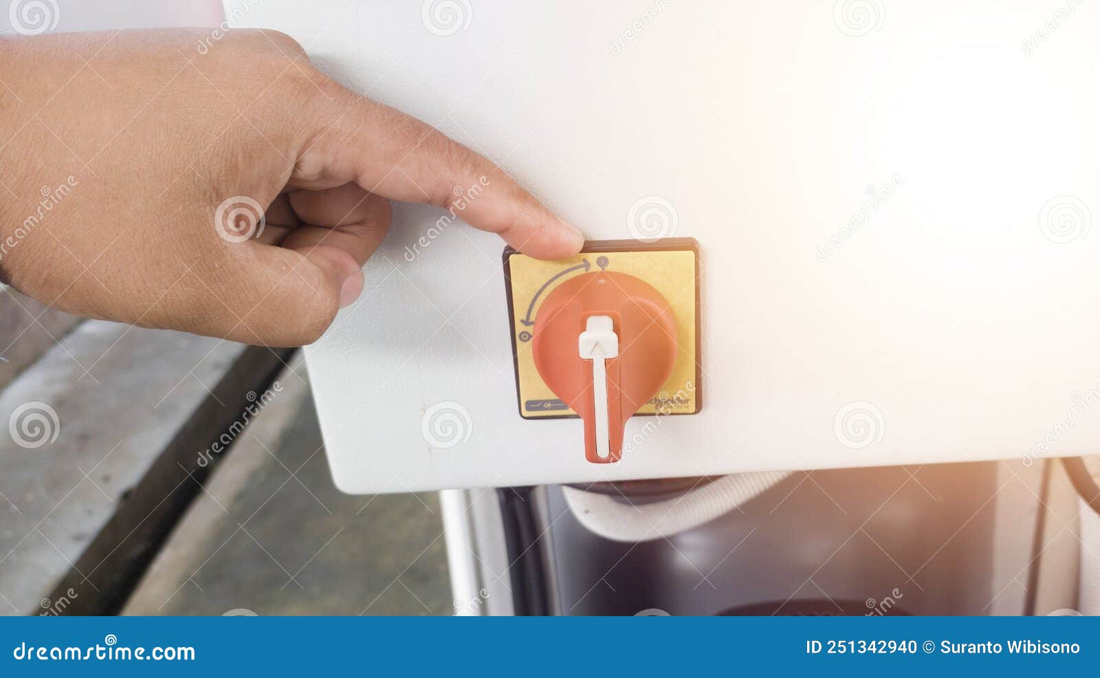 A Man Is Showing The Position Of Turning On The Rotary Switch ...