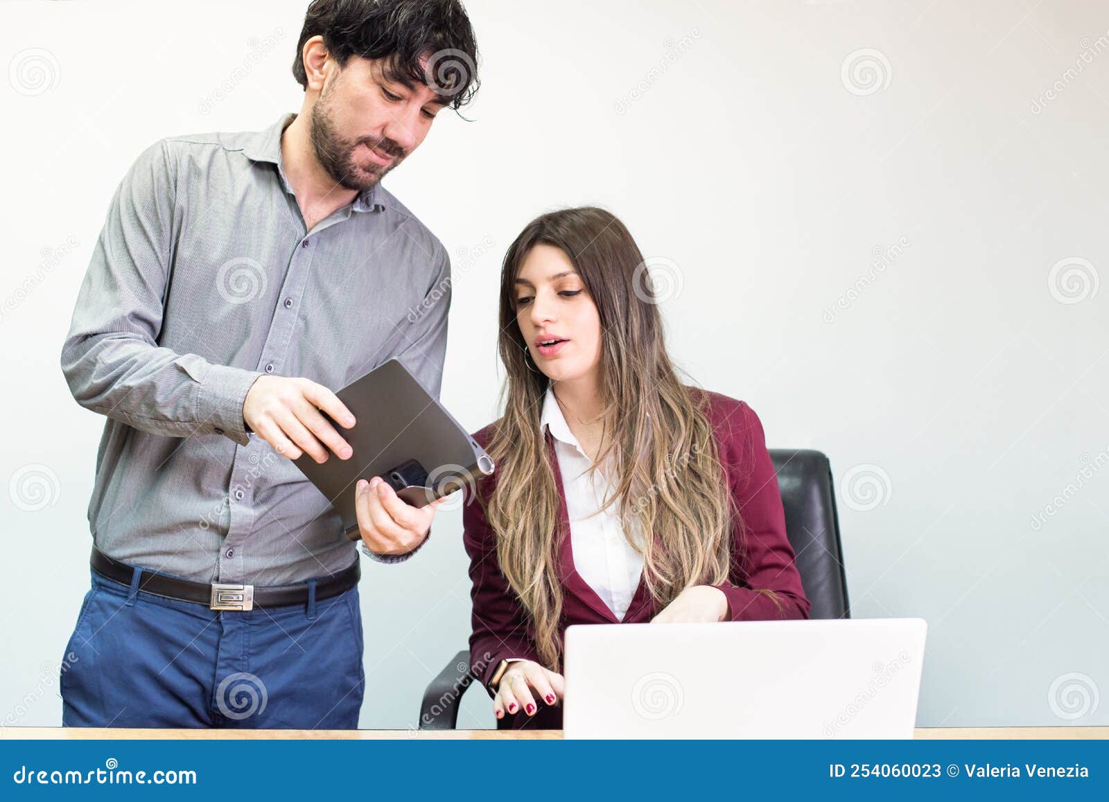 A Man Showing a Presentation To His Boss in the Office Stock Image ...